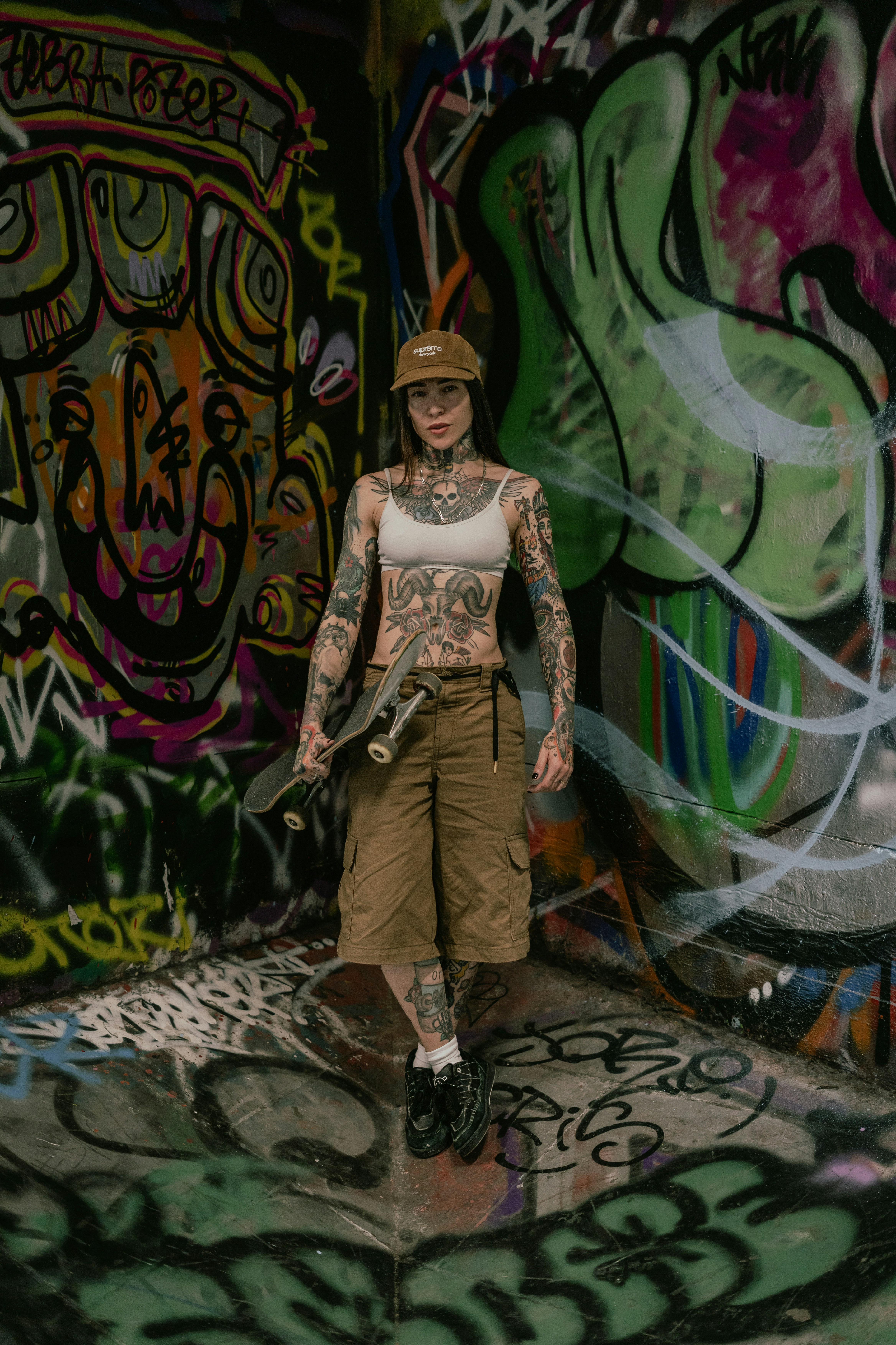 Urban Ink Voyager: A Tattooed Scout in Graffitied Denima