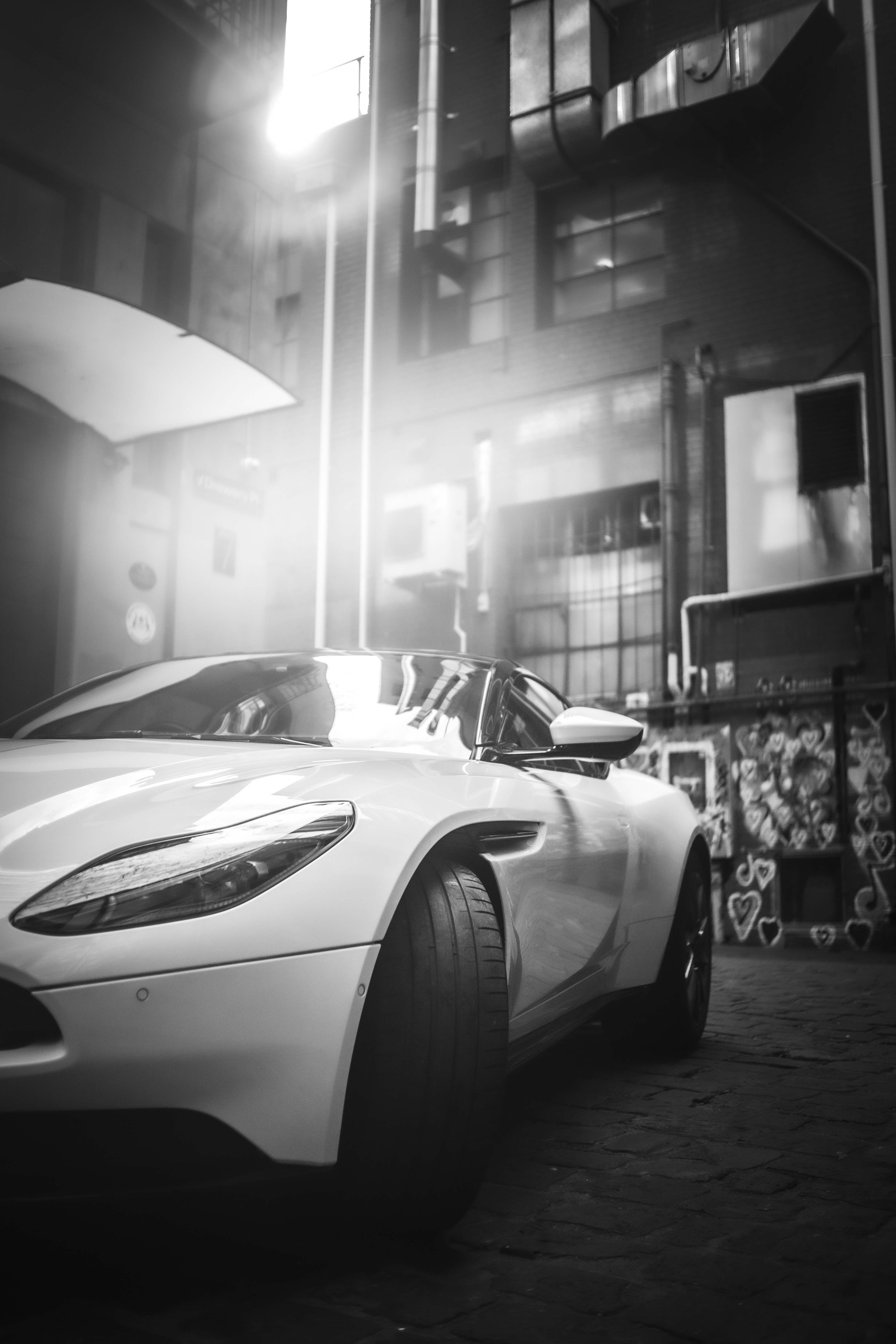 White Charger in a Neon-Soaked Alley