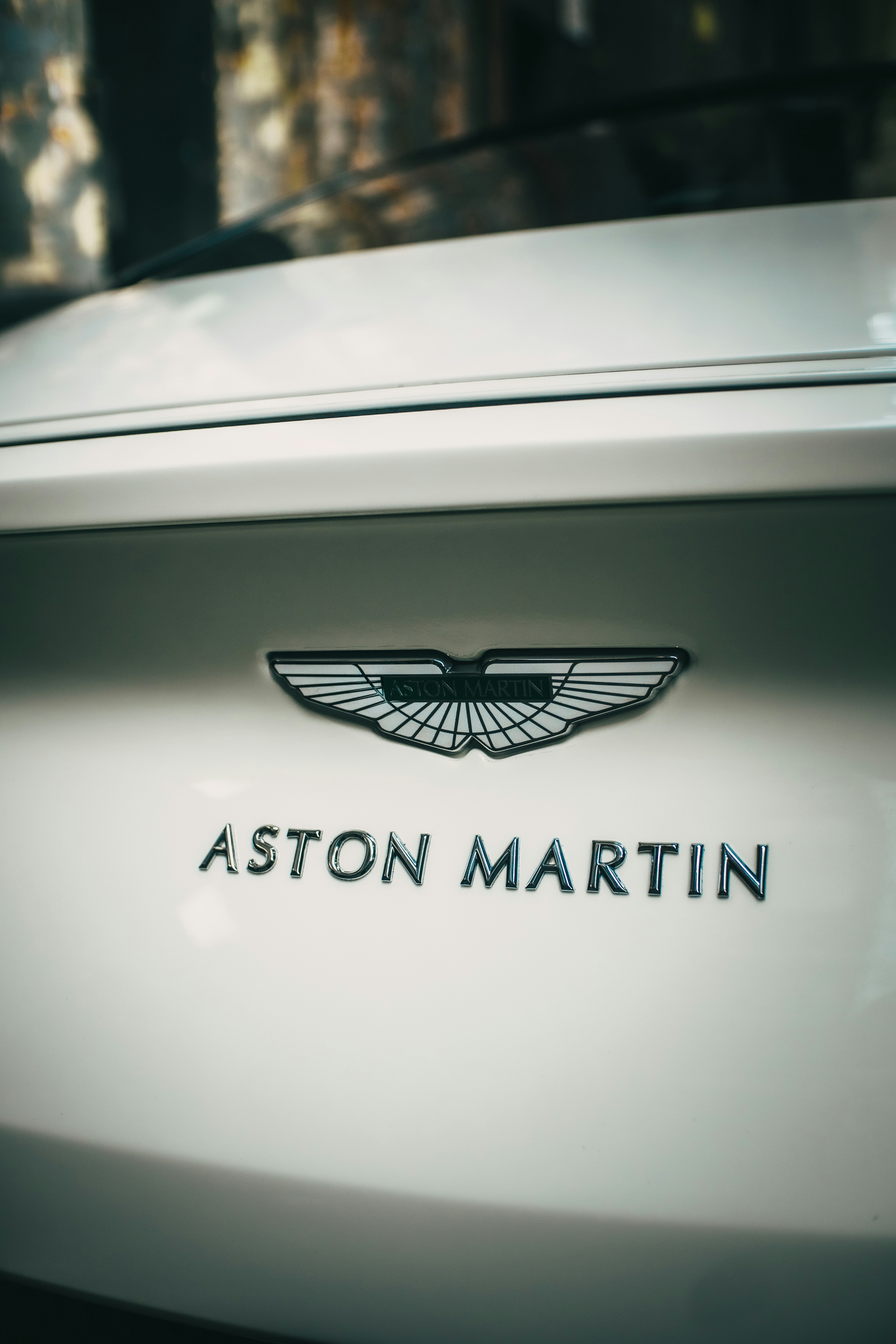 Aston Martin Emblem: Quiet Luxury on the Car’s Tail