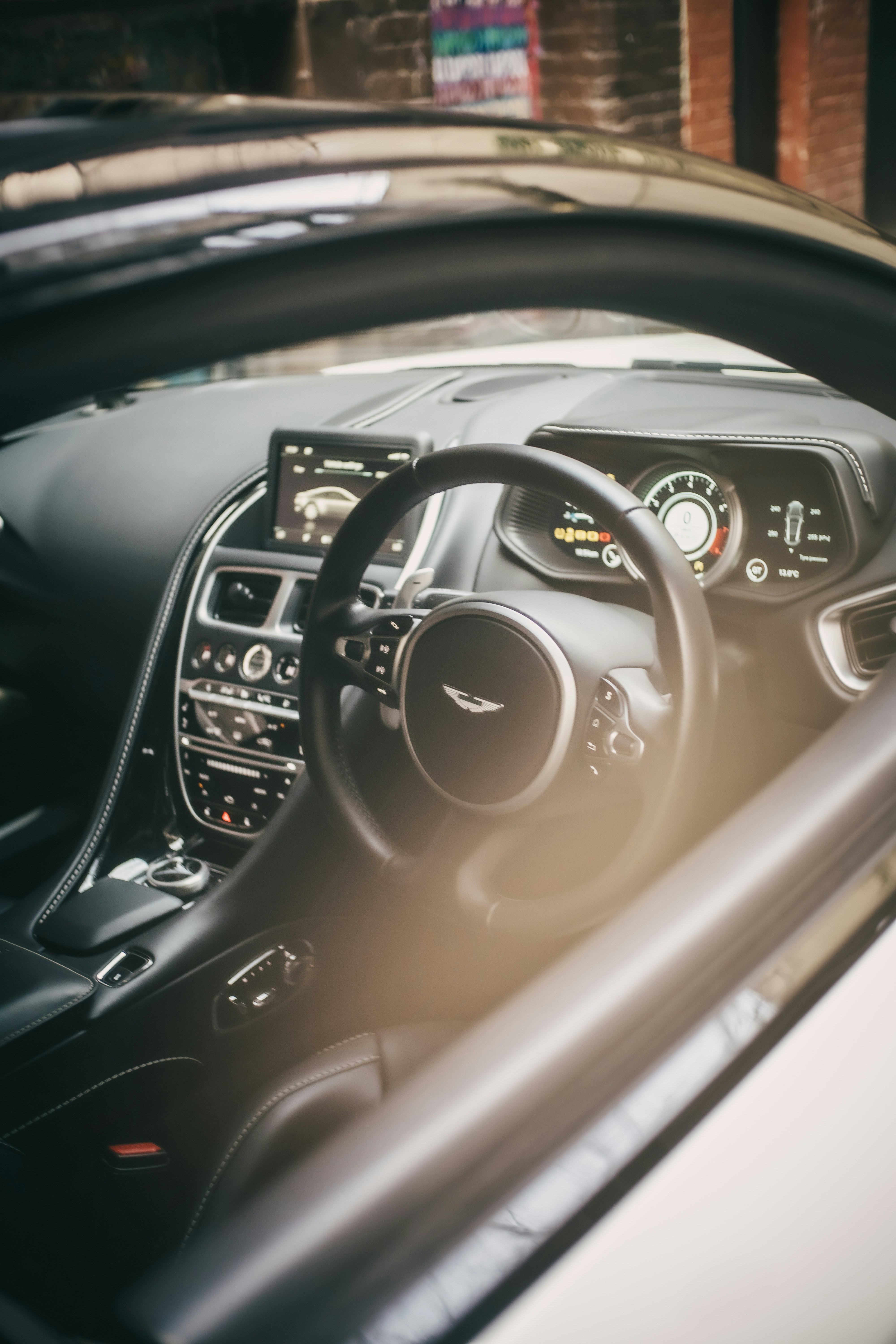 Steering into Detail: Inside the Cockpit of a Modern Aston Martin