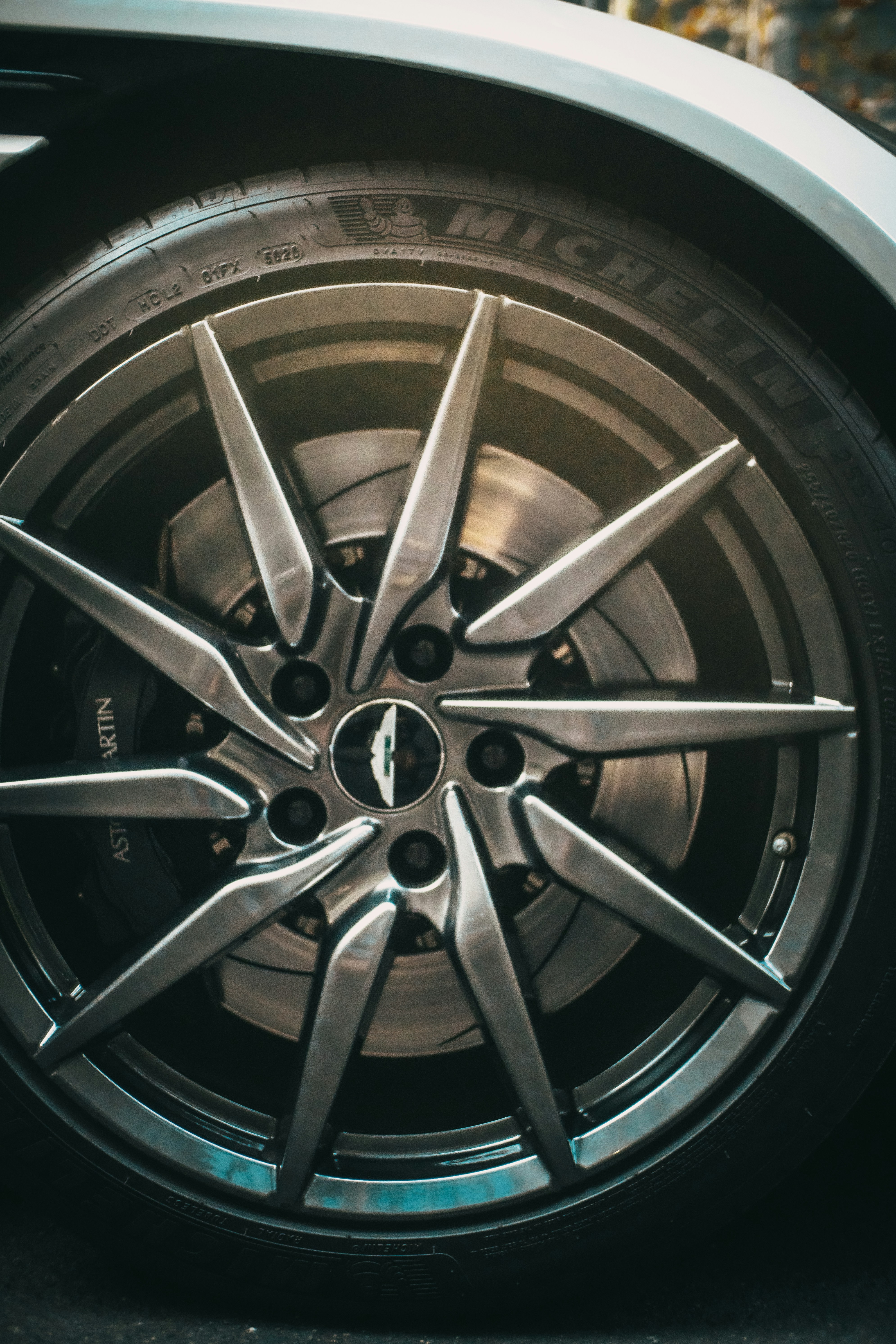 Angular Wheel Symphony: A Close-Up of Precision Alloy and Tire Texture