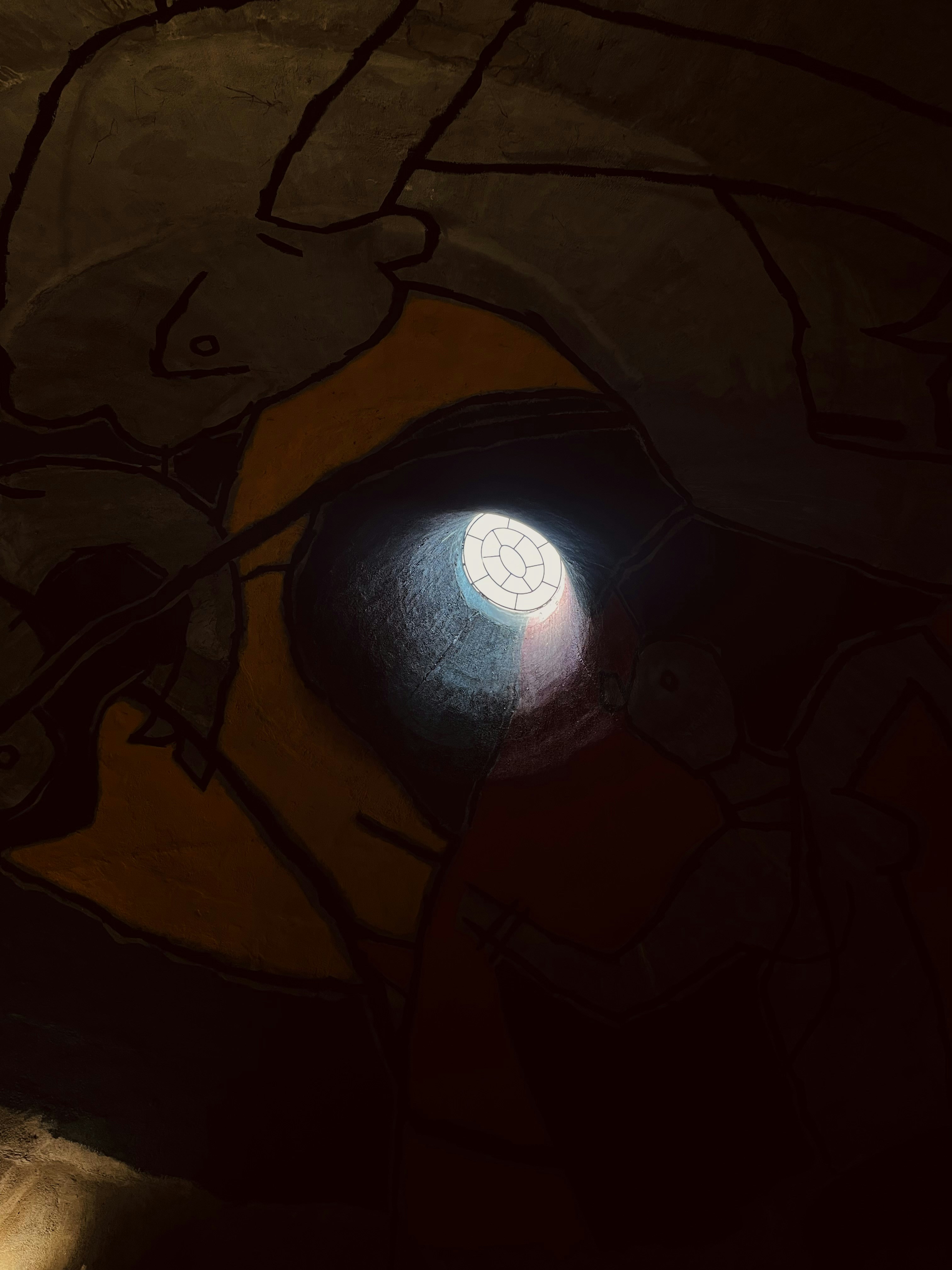 Looking Up Through the Painted Abyss: A Circular Light at the Core