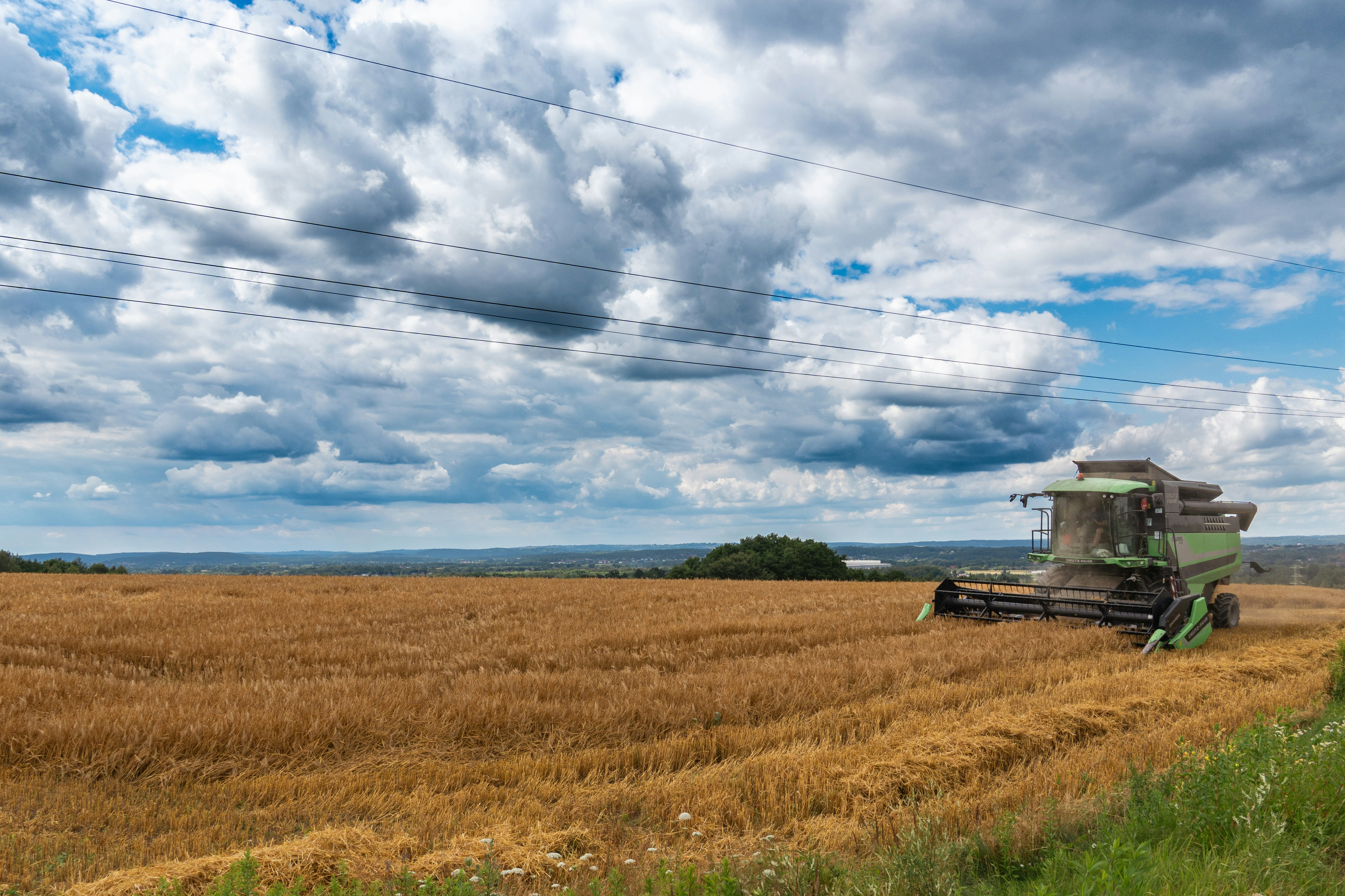 Harvest Horizon: The Combine Rests Amid Golden Stalks