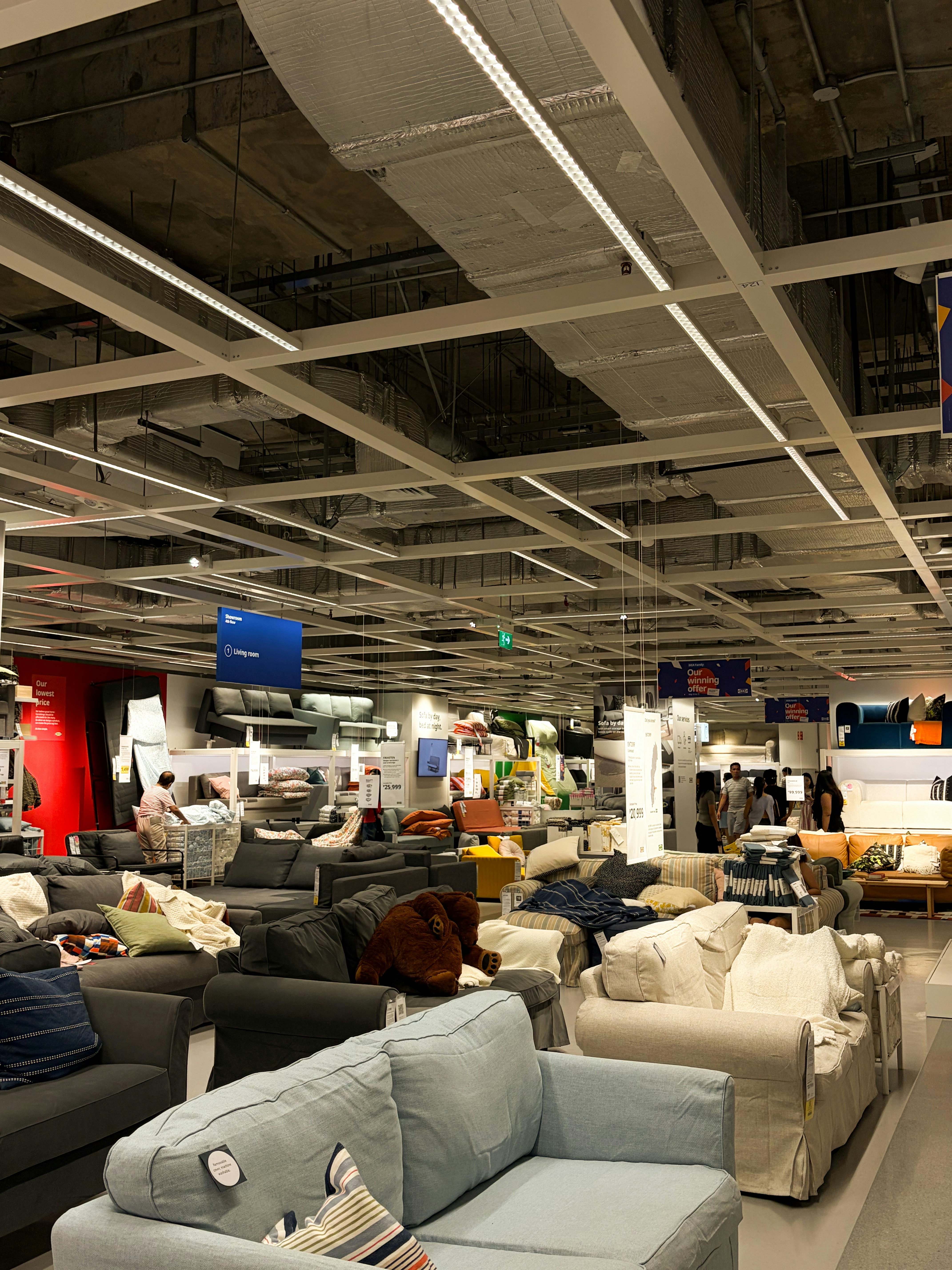Aisle of Comfort: Couch Parade in a Bright Furniture Hall
