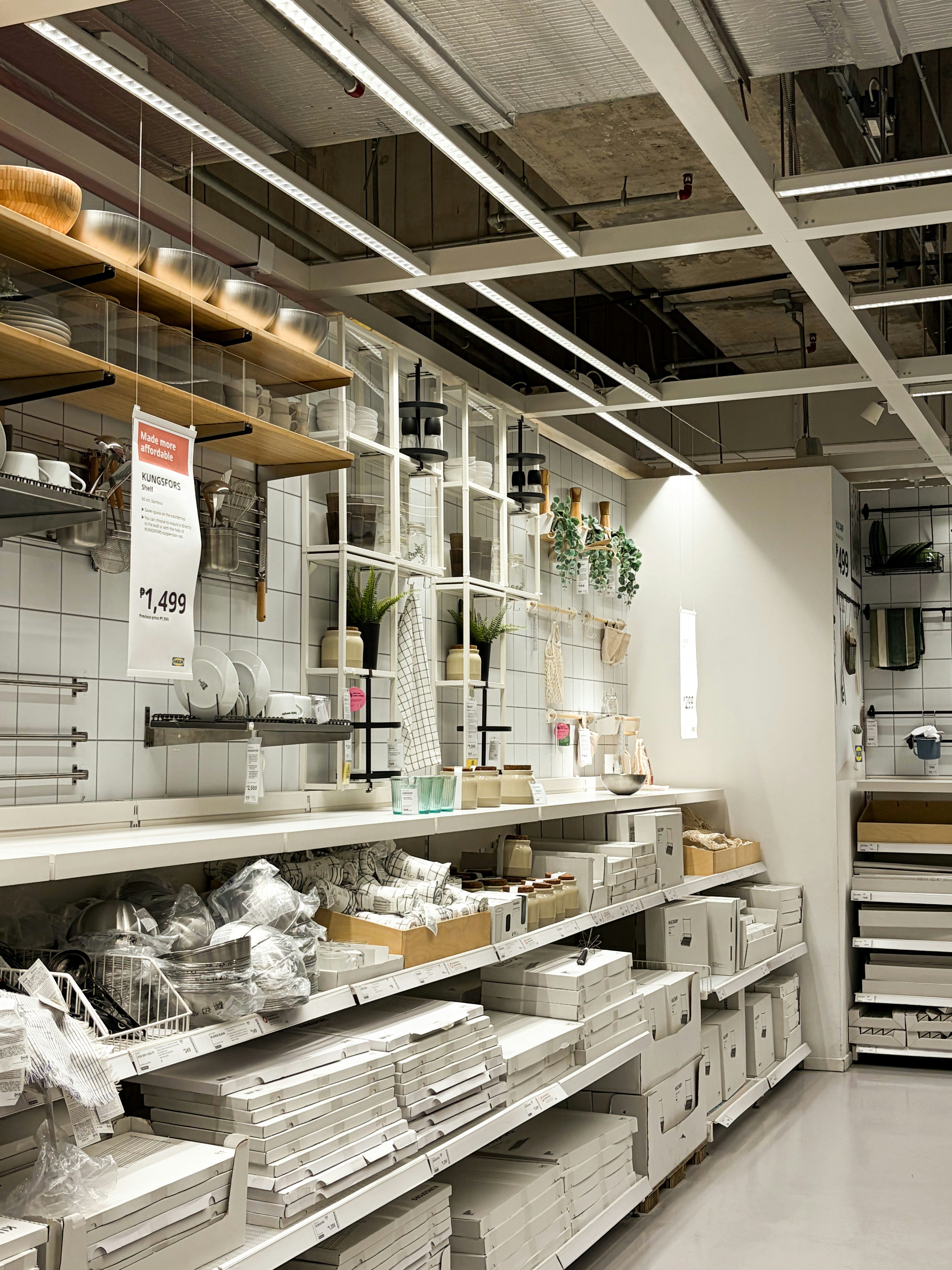 Aisle of Home Essentials: Neatly Stocked Shelves in a Modern Store