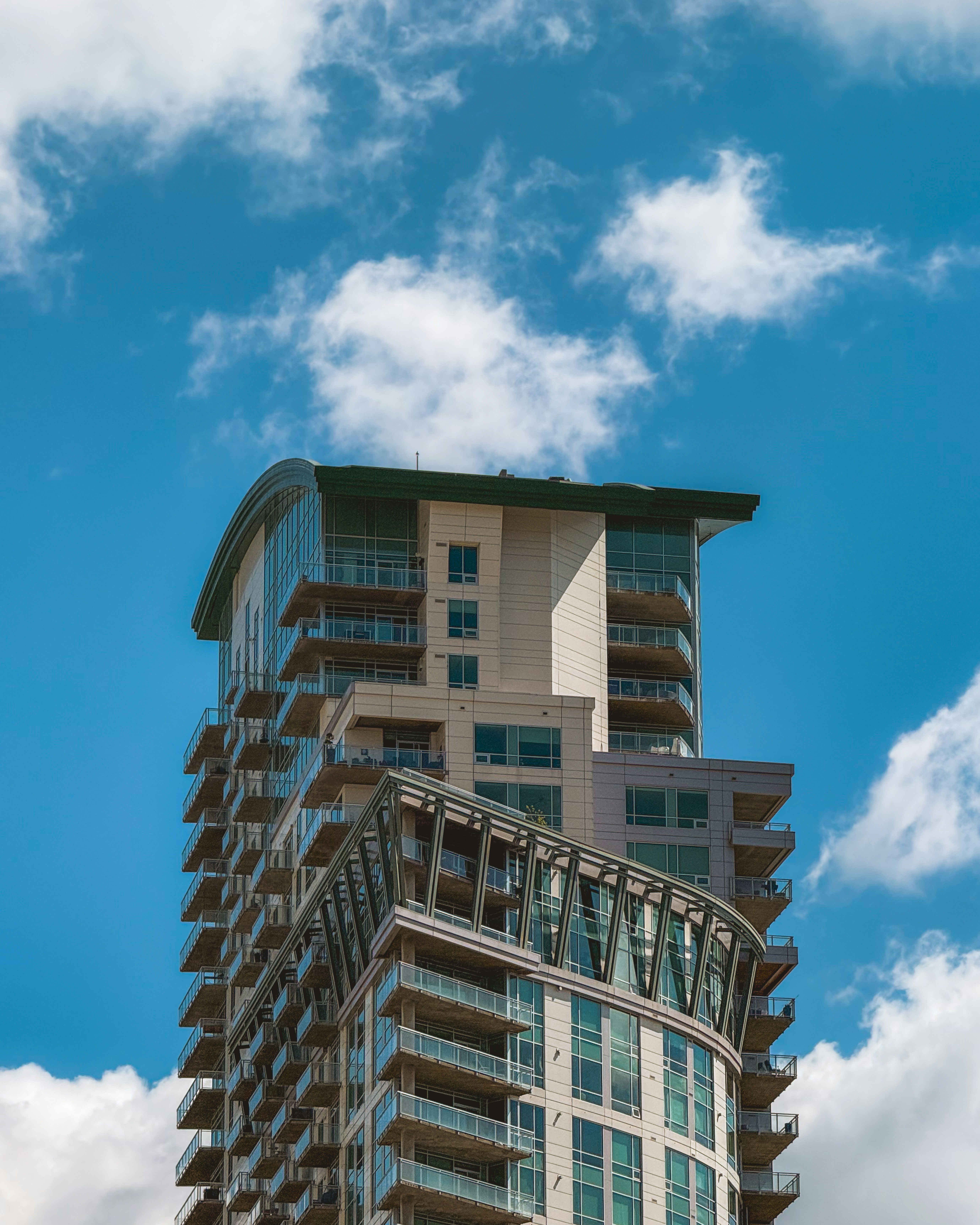 Skyward Curve: A High-Rrise Ribbon of Glass and Steel