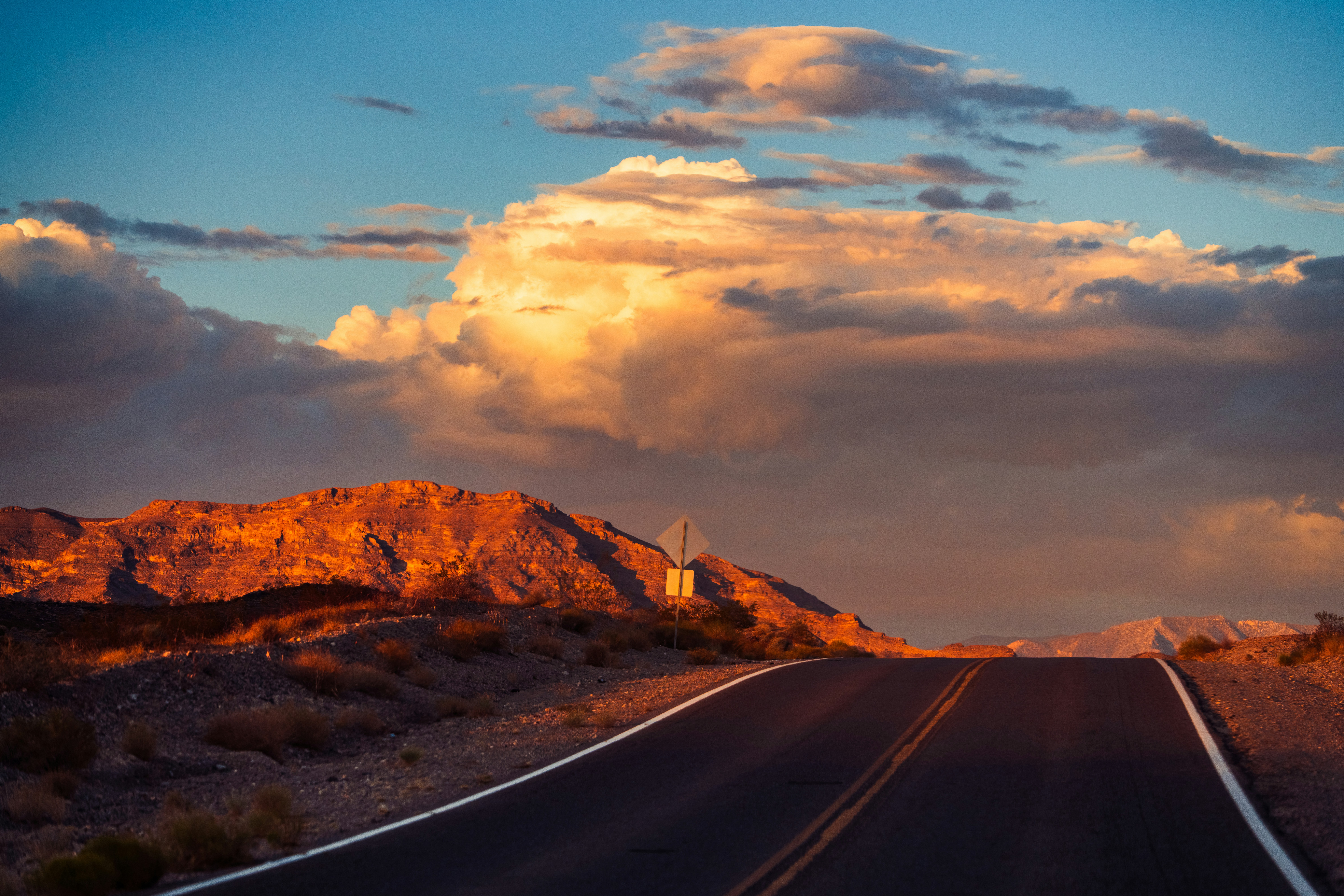 Desert Highway at Golden Hour: Canyon Light on the Horizon
