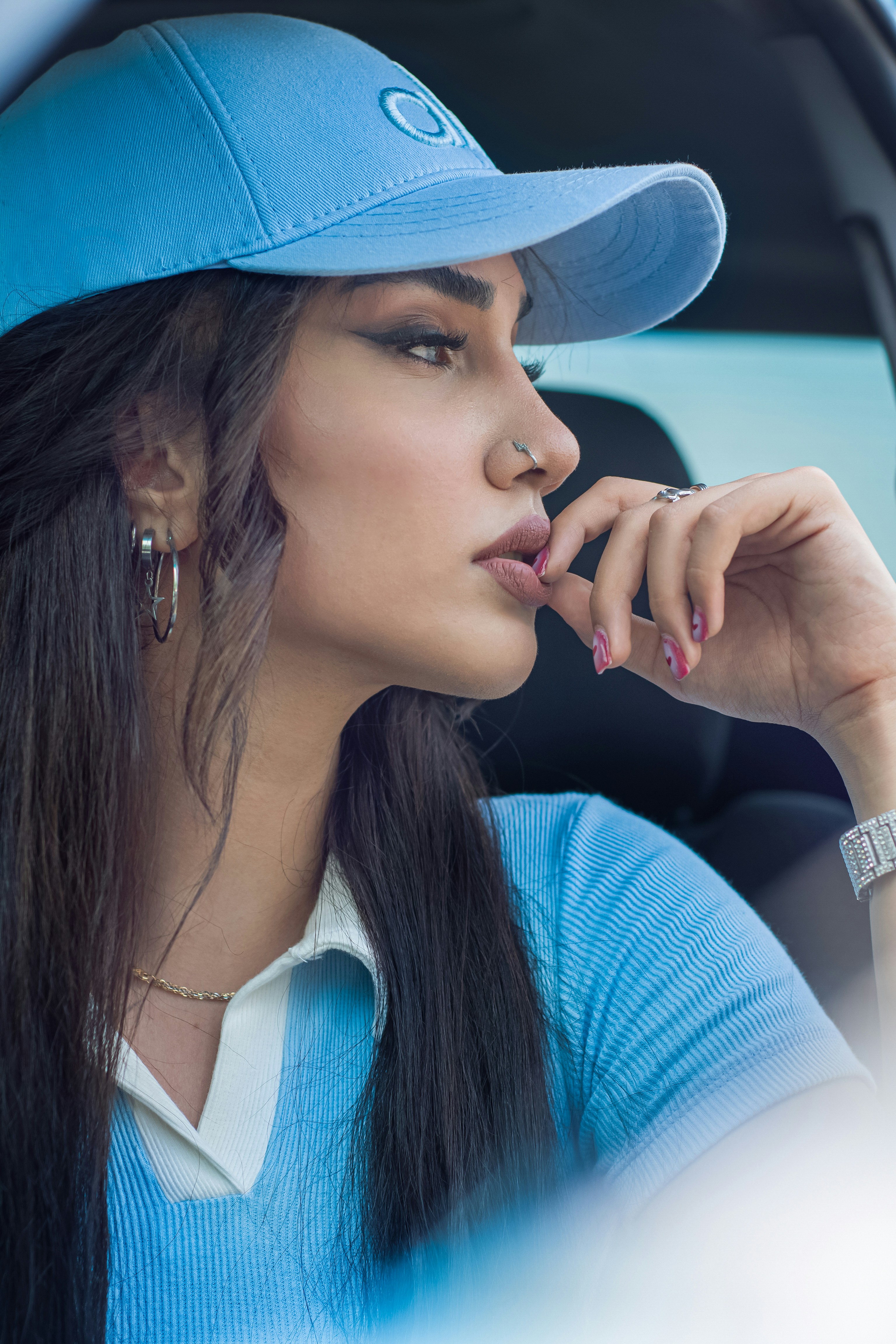Blue Cap, Calm Gaze: A Portrait in Quiet Contemplation