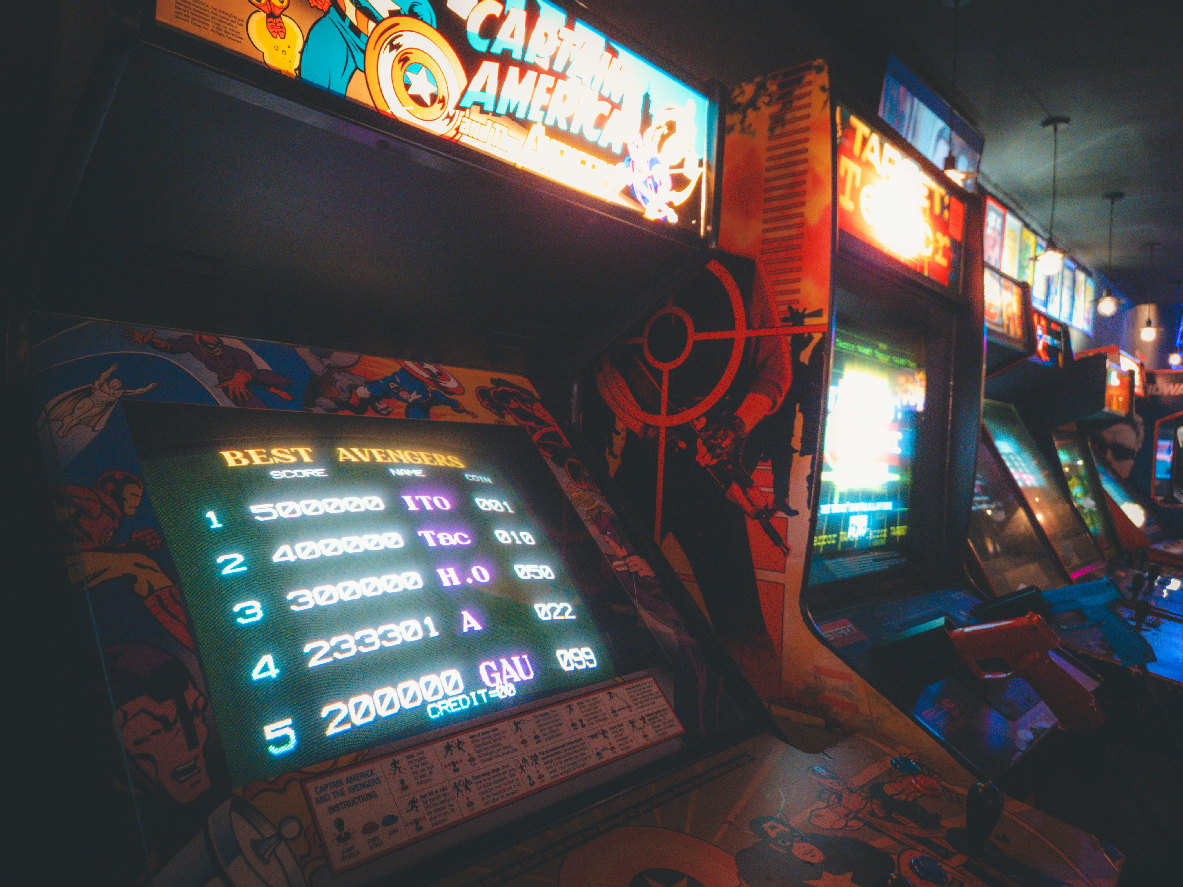 Neon Arcade Portrait: A Row of Vintage Cabinets in Electric Glow