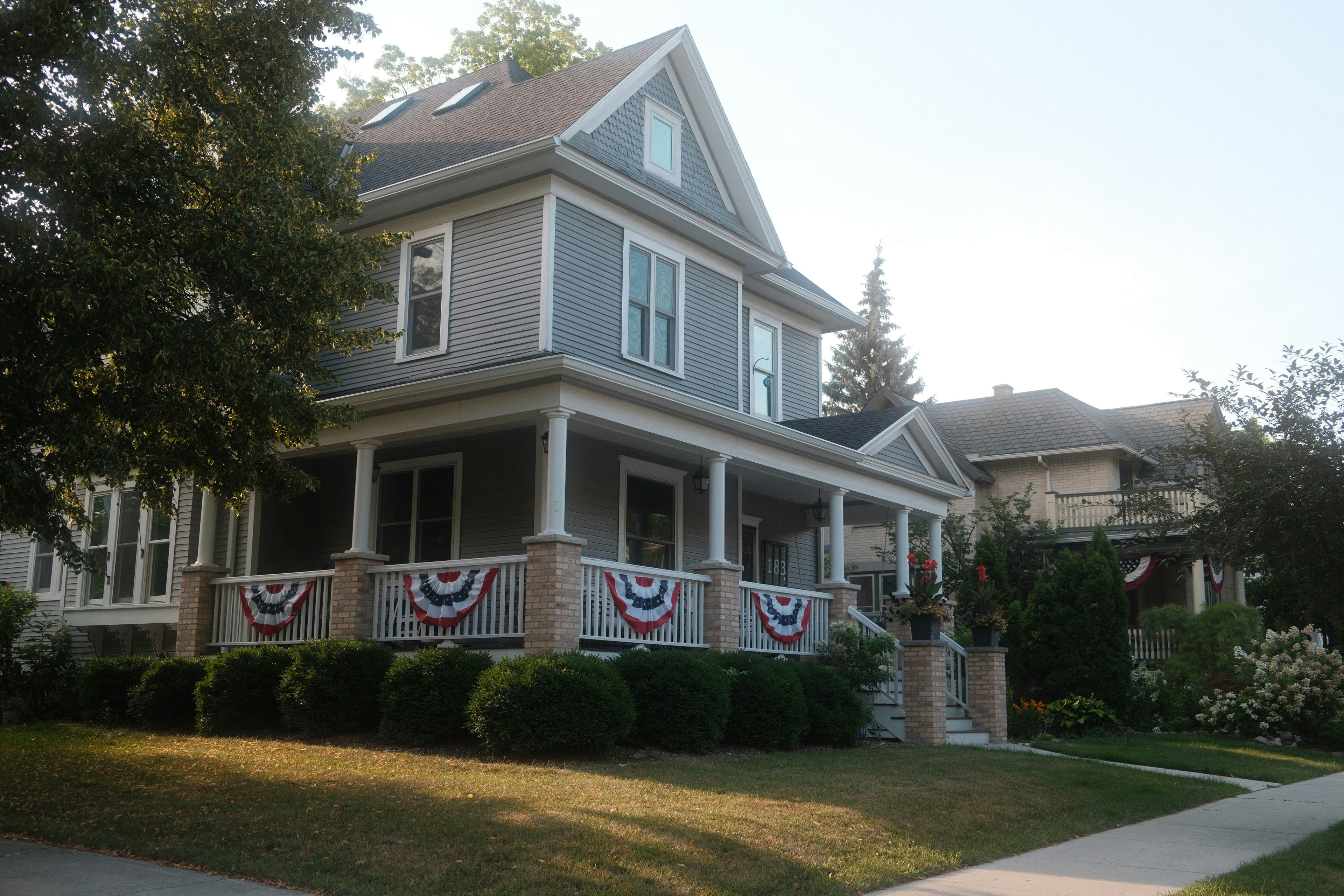 Patriotic Veranda: A Classic Porch Adorned with Red, White, and Blue