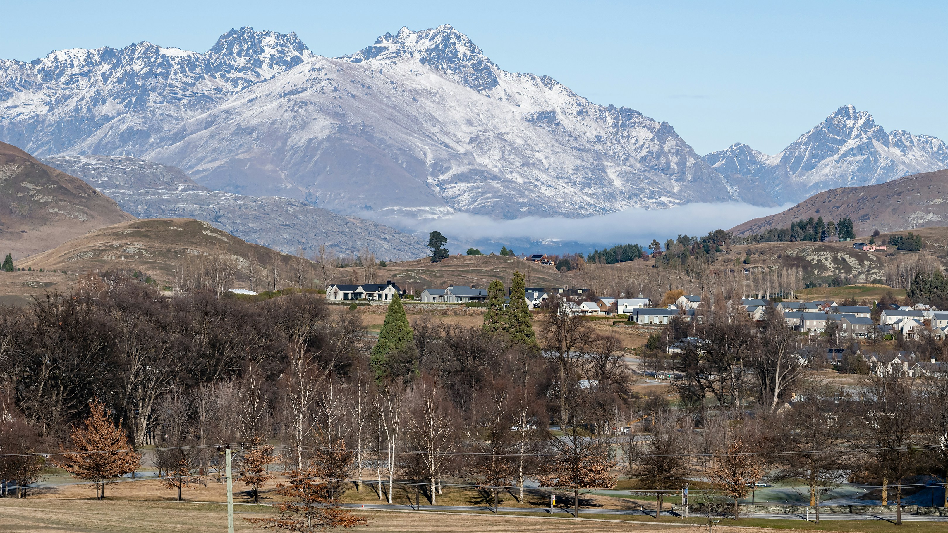 Snow-Spired Valley: A Mountain Village Under Alpine Peaks