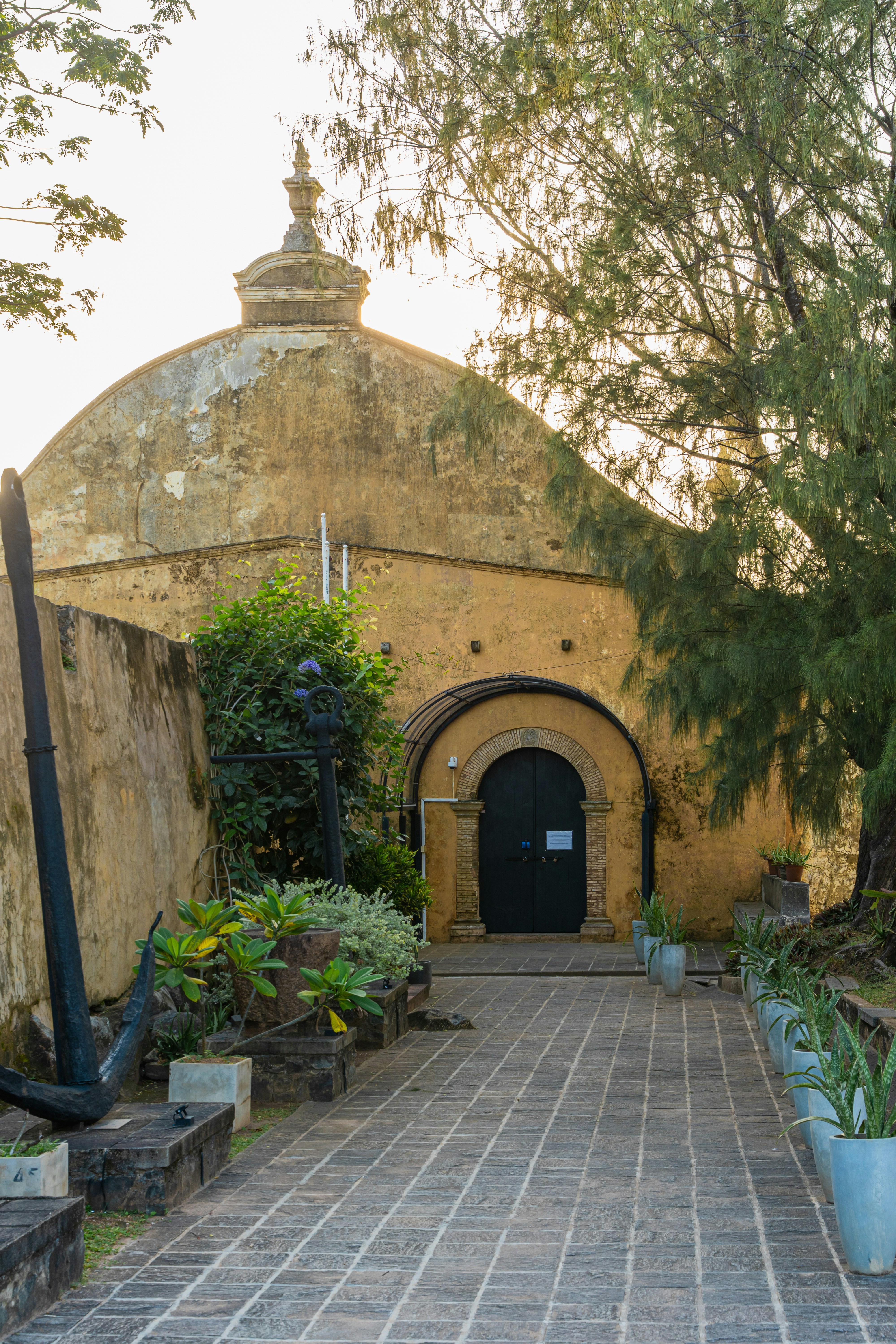 Arched Doorway in a Sunlit Cloister