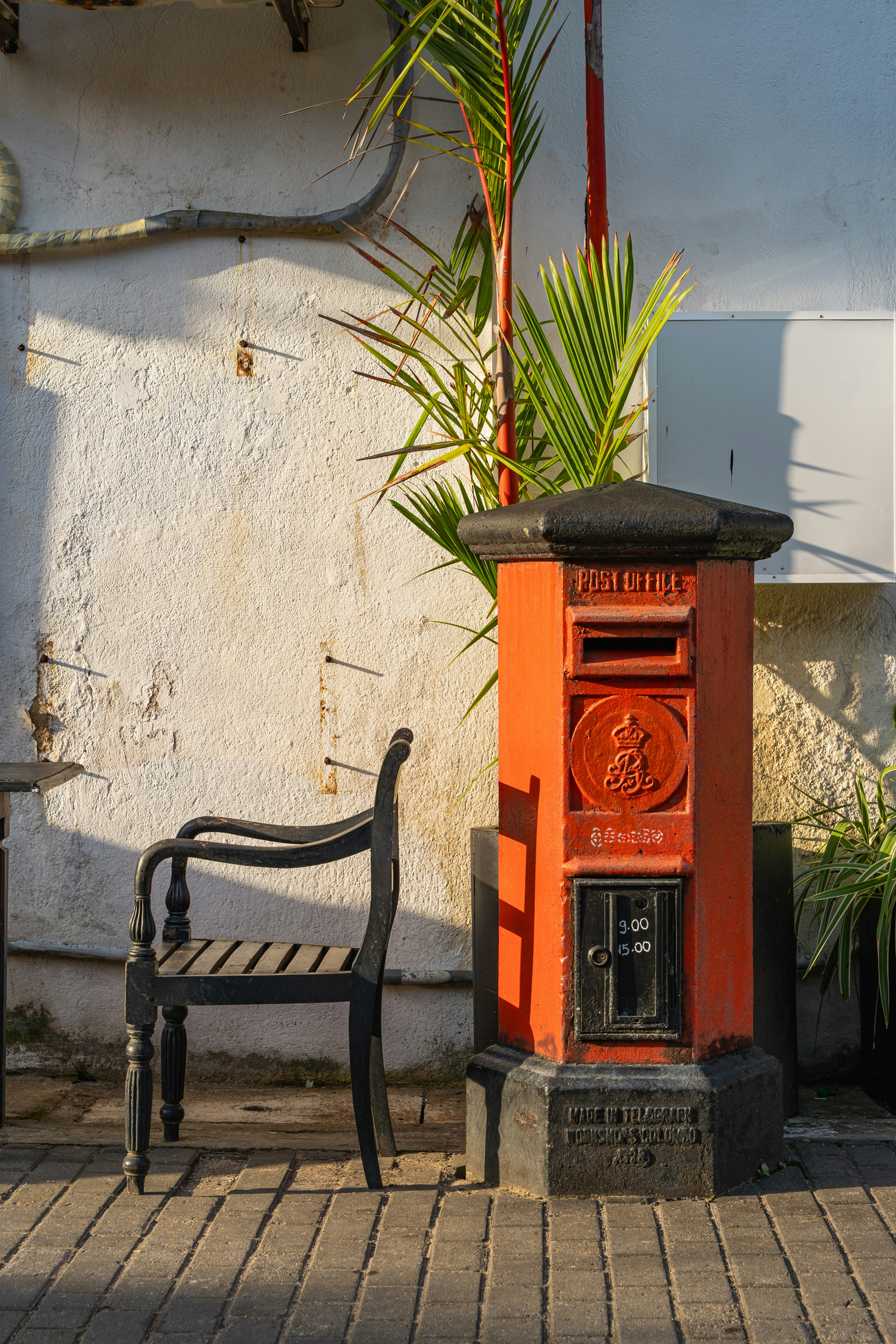 Red Mailbox and Bench in Warm Afternoon Light