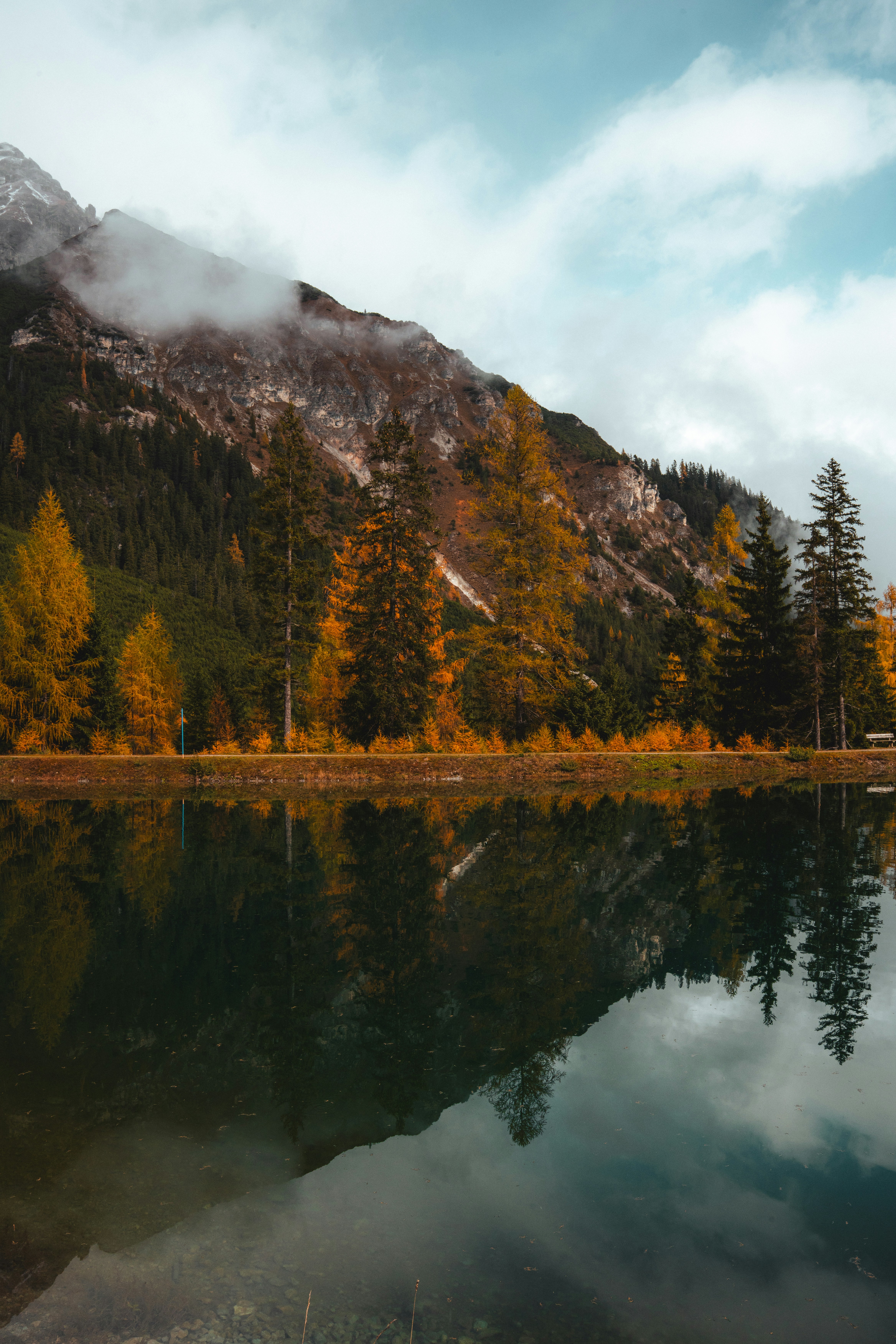 Autumn Ridge Reflections by the Alpine Lake