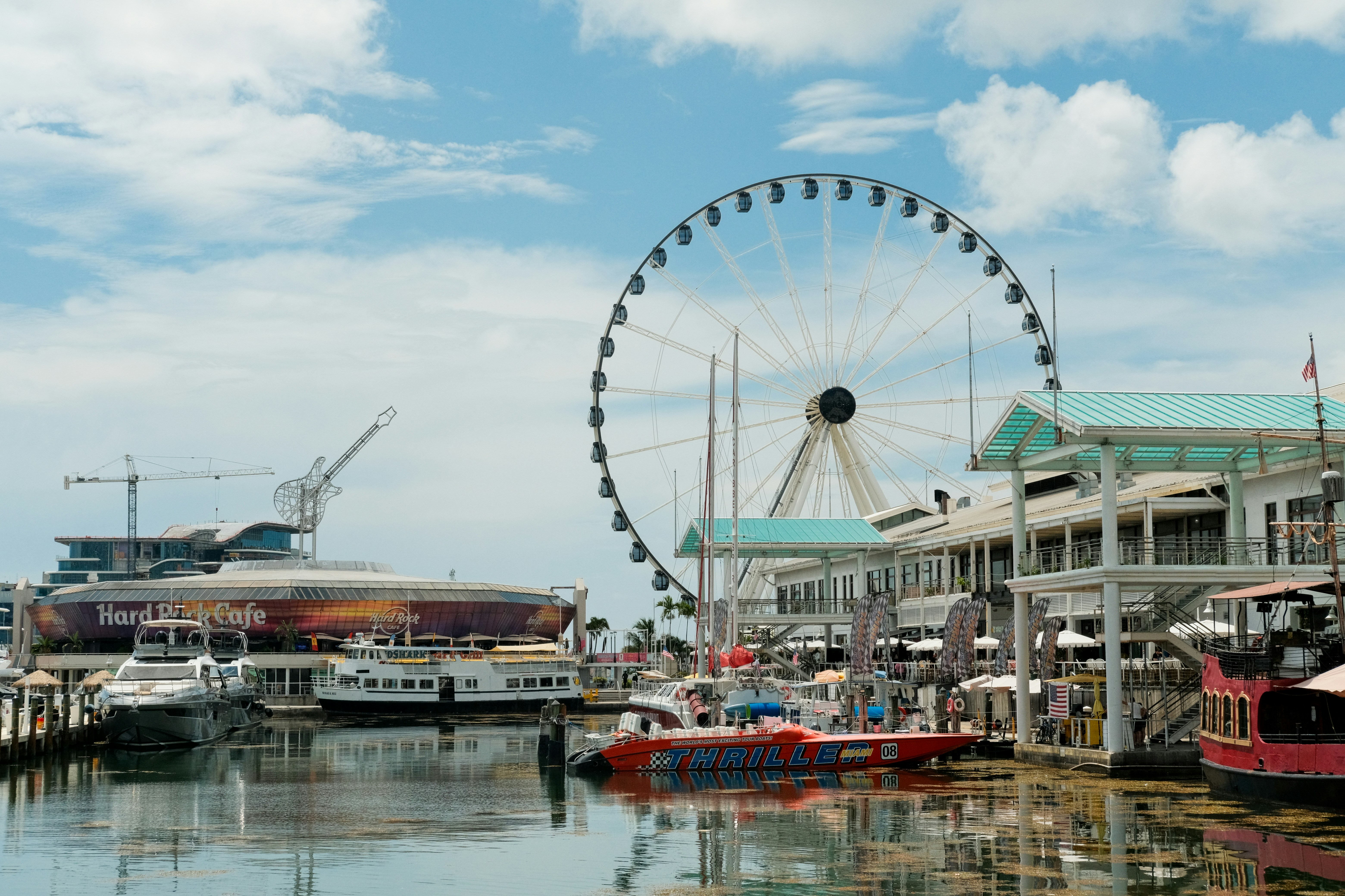 Harbor Vista: Playground of Ferris Wheel and Boats