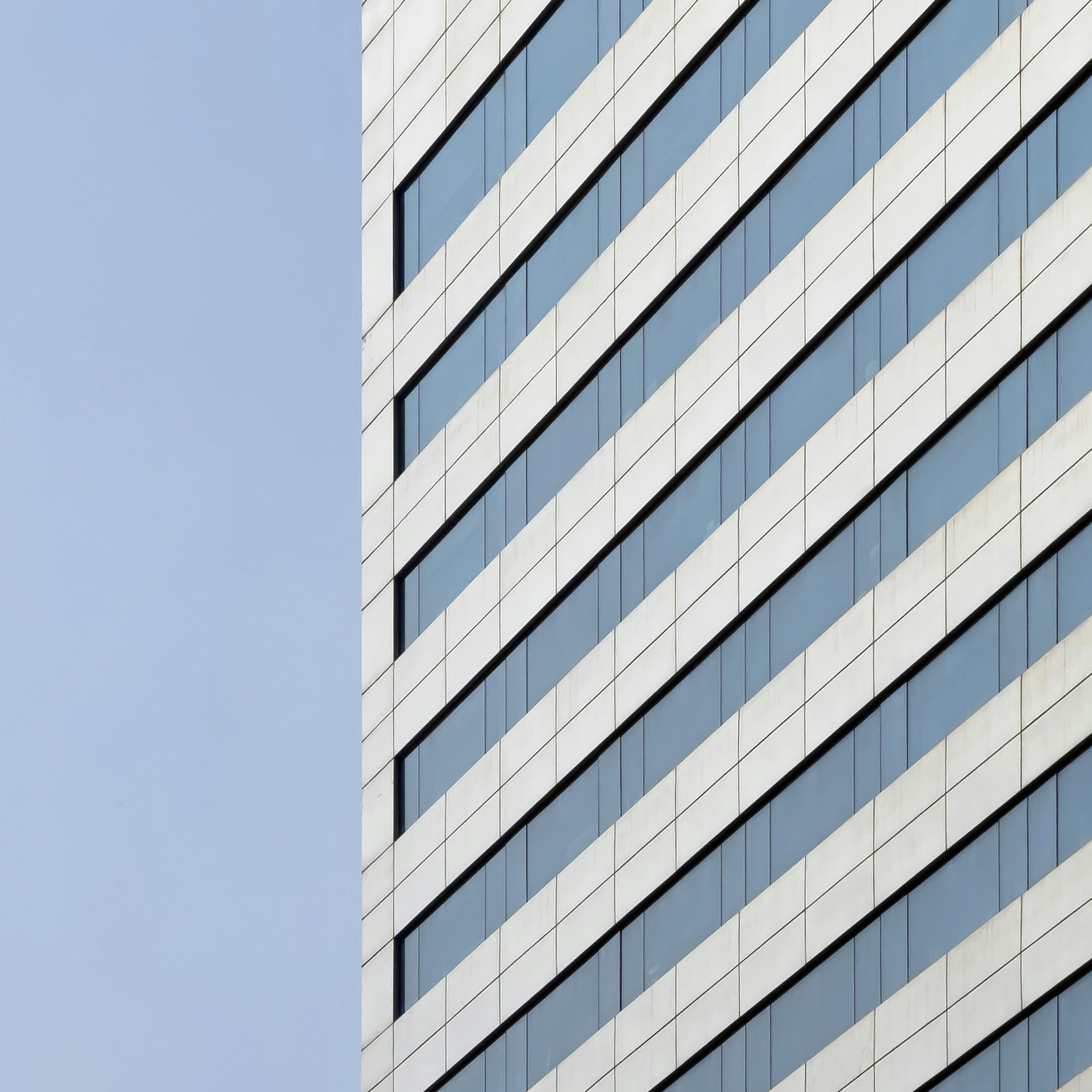 Vertical Lines, Horizontal Light: Facade Geometry in Blue Sky