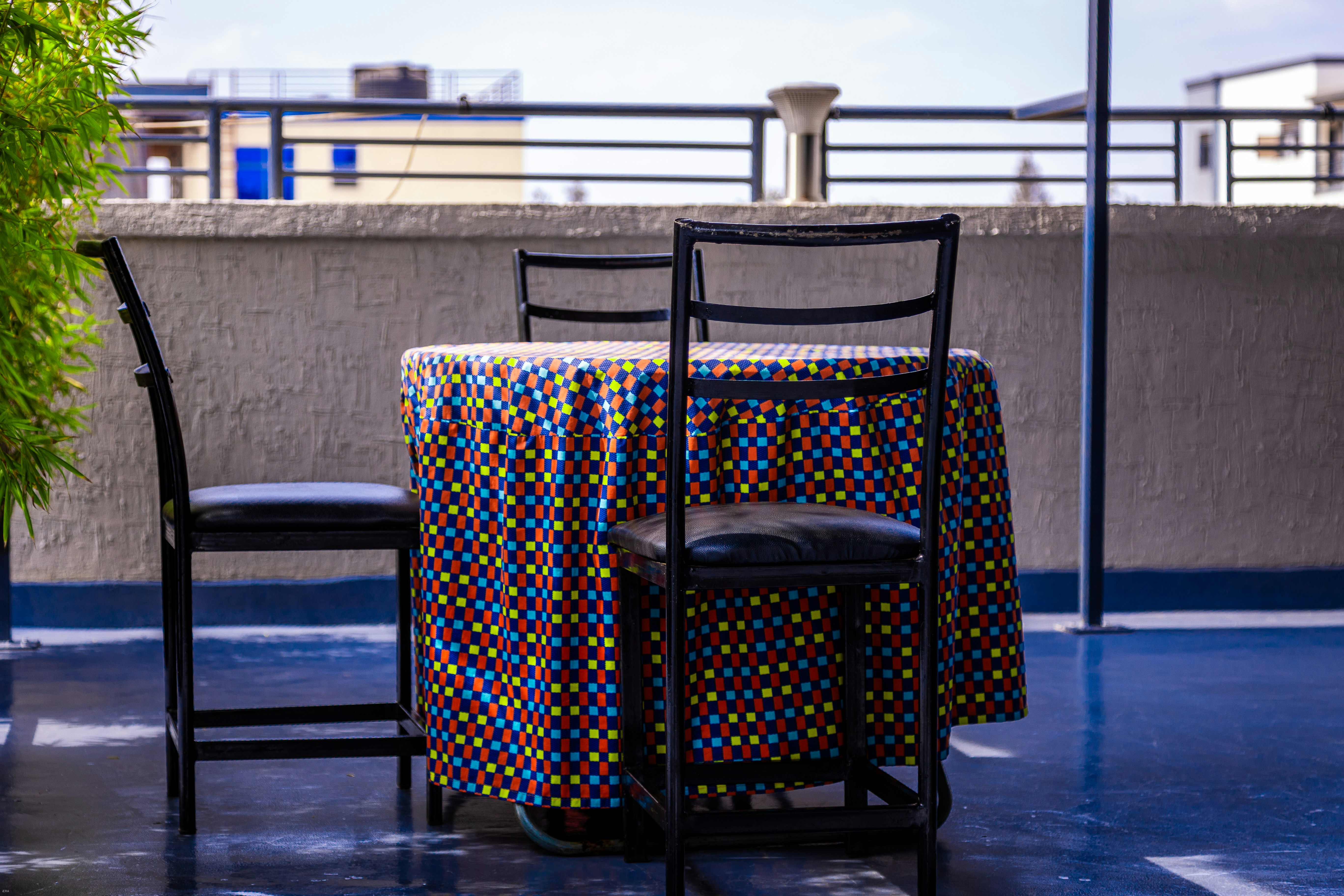 Colorful Tablecloth on a Rooftop Evening