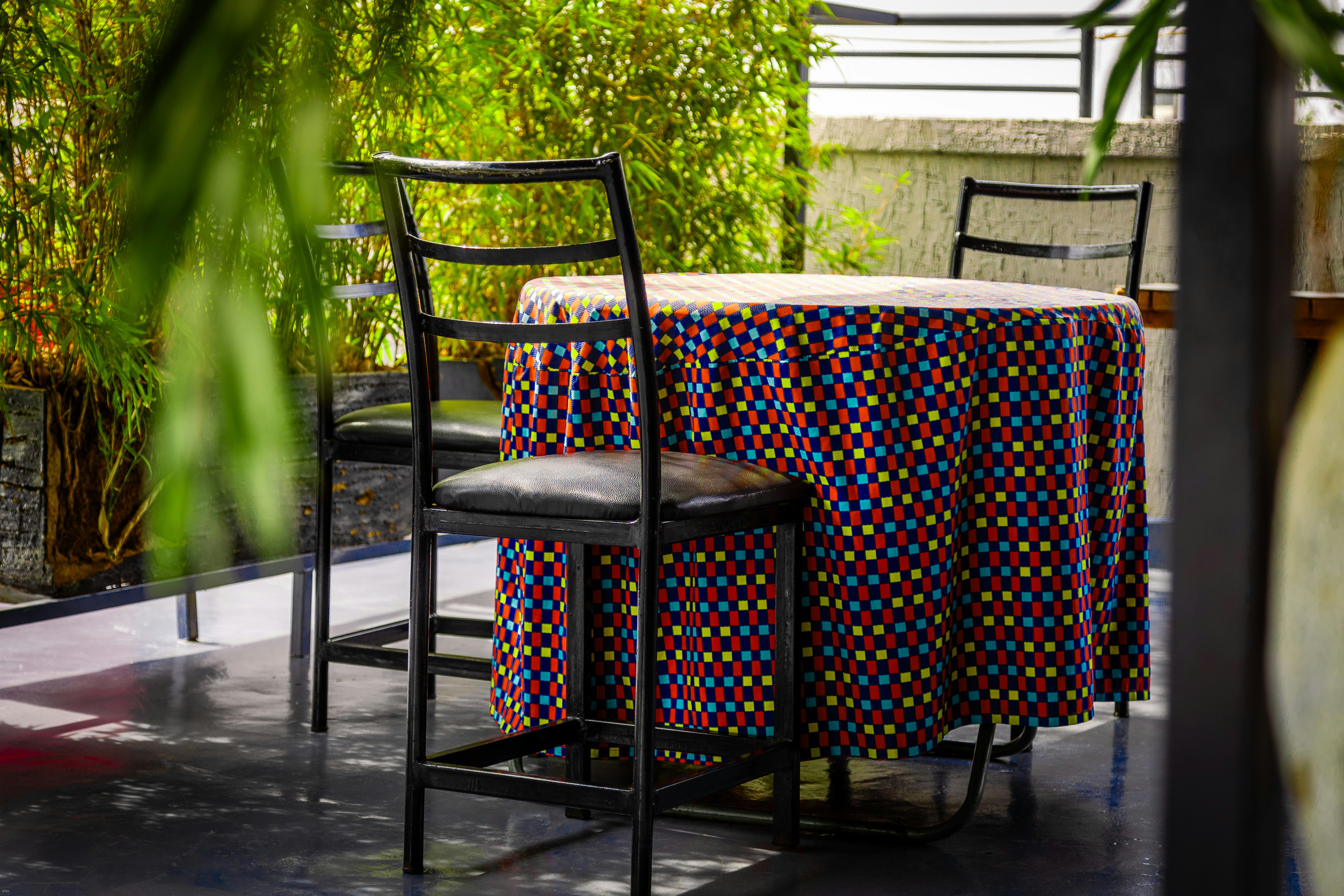 Colorful Tablecloth Under Evening Rooftop Light