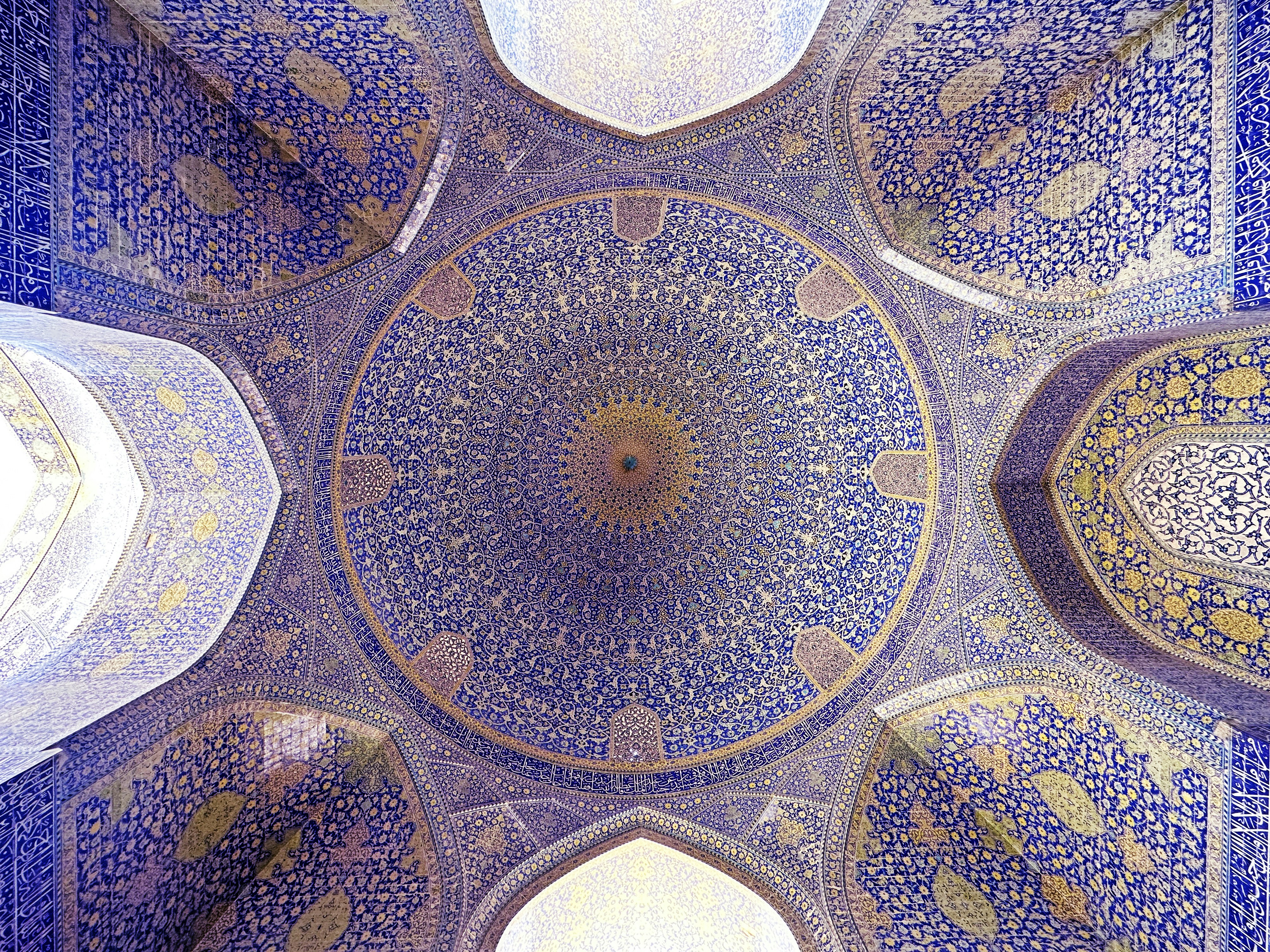Intricate Mosque Dome: A Symmetrical Mosaic of Blue and Gold