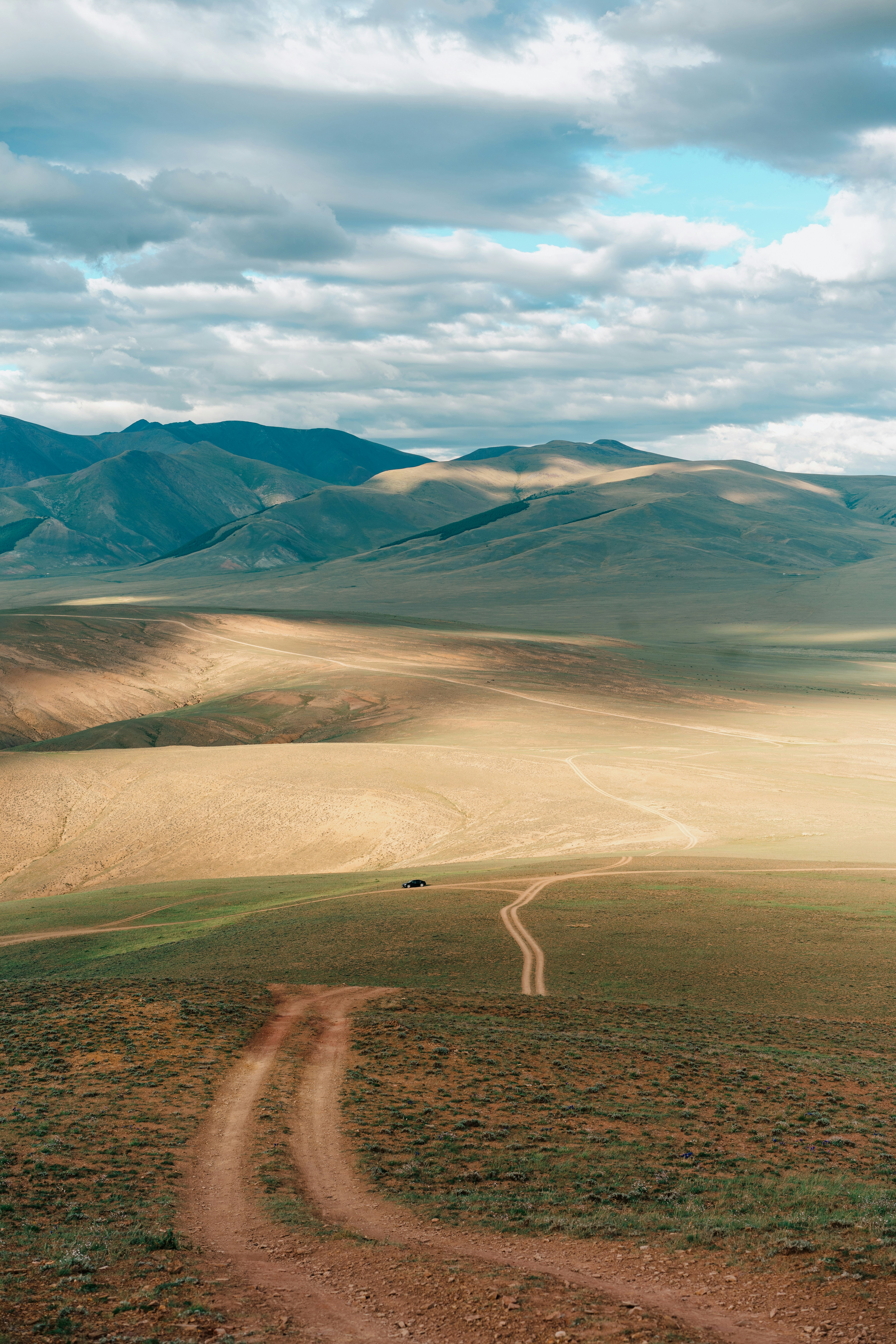 Winding Road through Silver Hills at Dusk