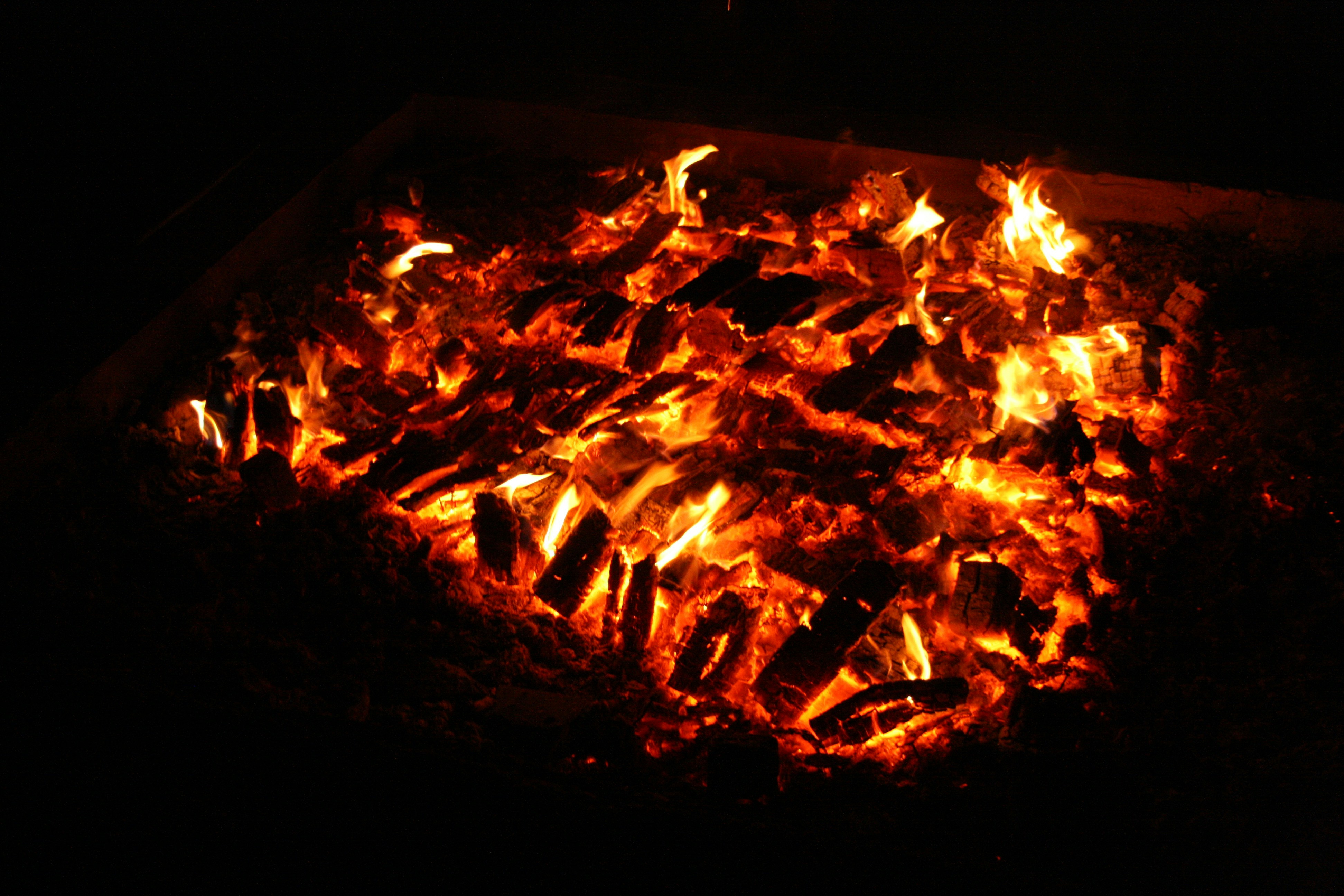 Ember Compass: Glowing Coals in a Quiet Night