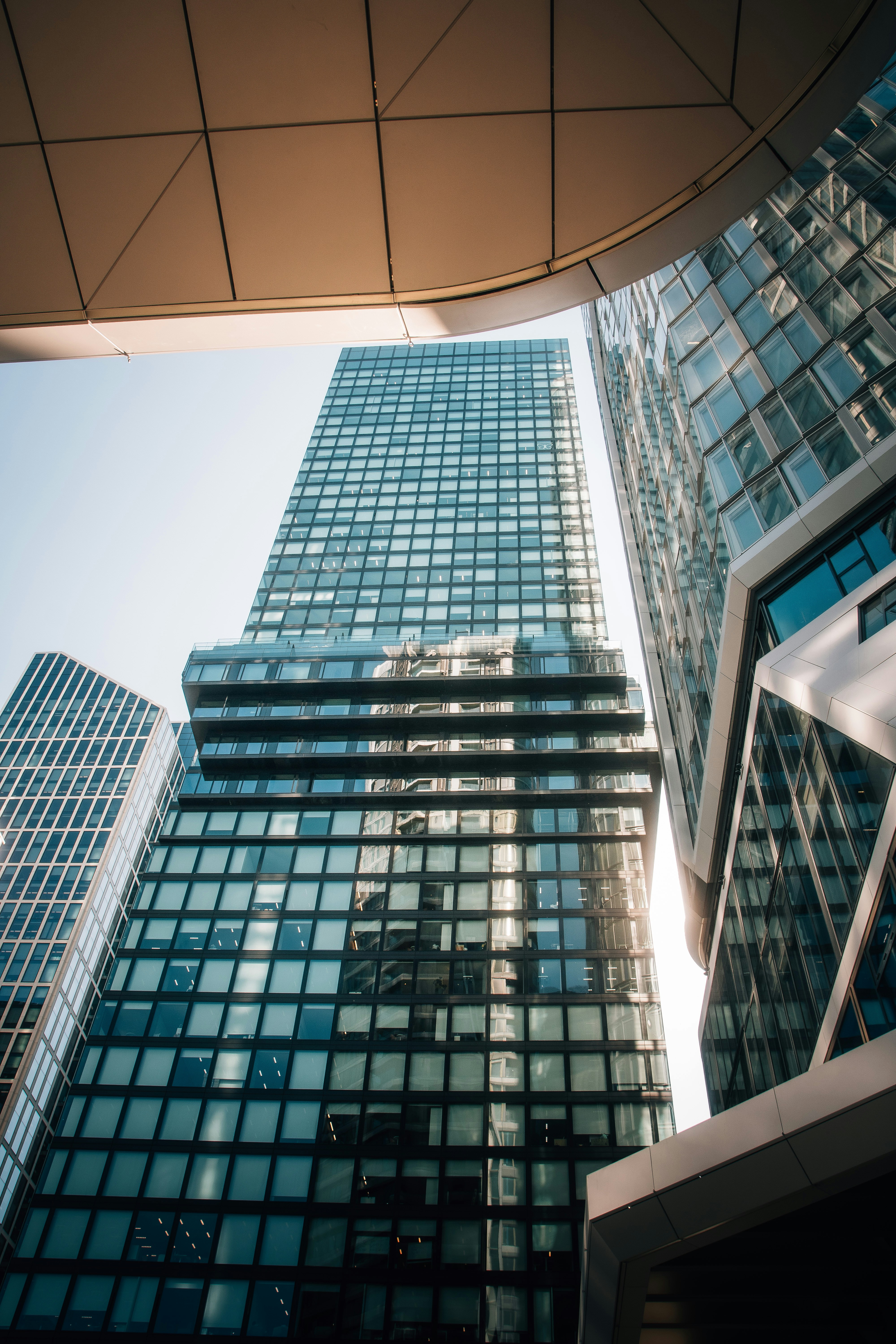 Urban Prism: A Skyward Ballet of Glass and Steel
