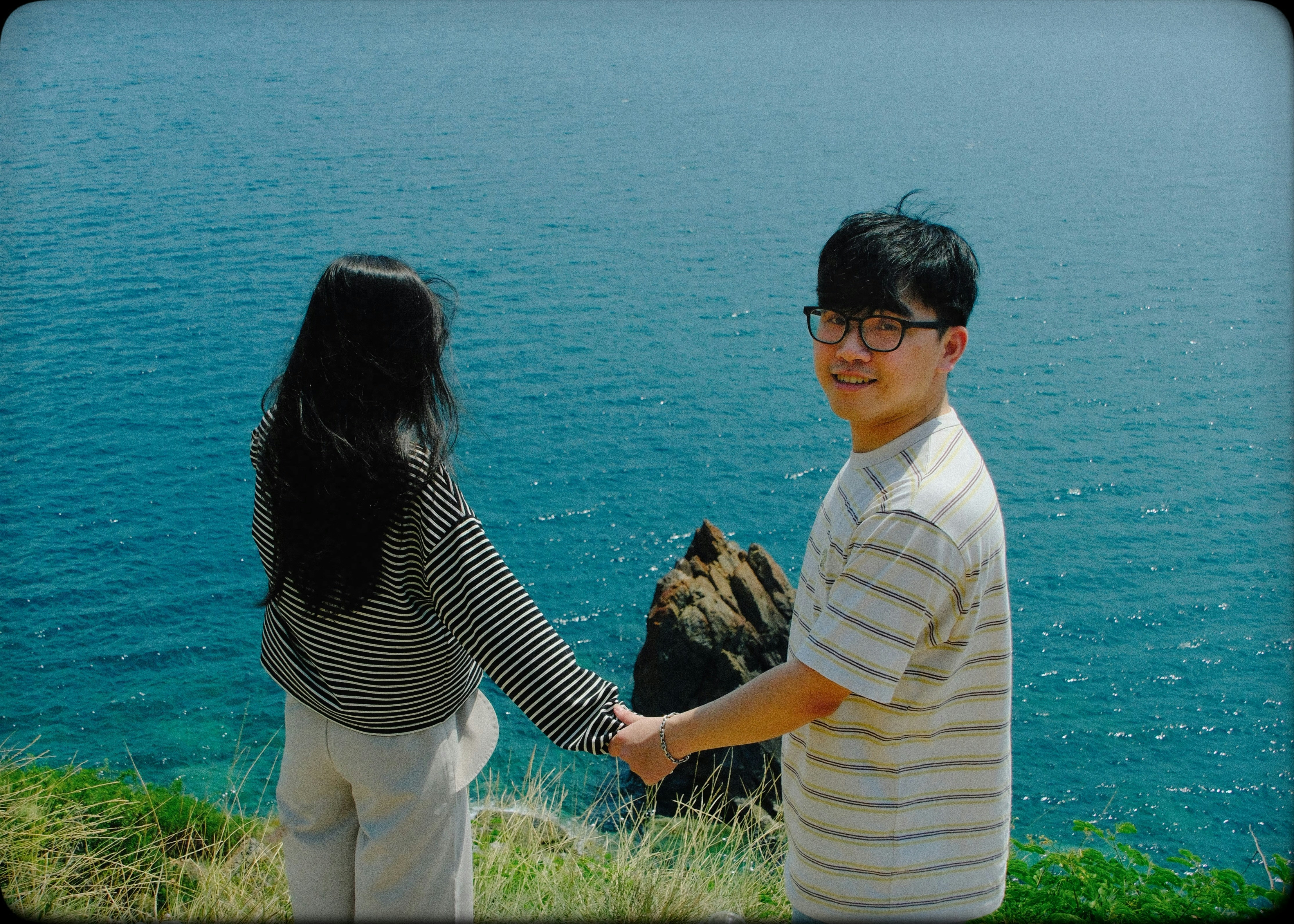 Holding Hands at the Edge of the Blue