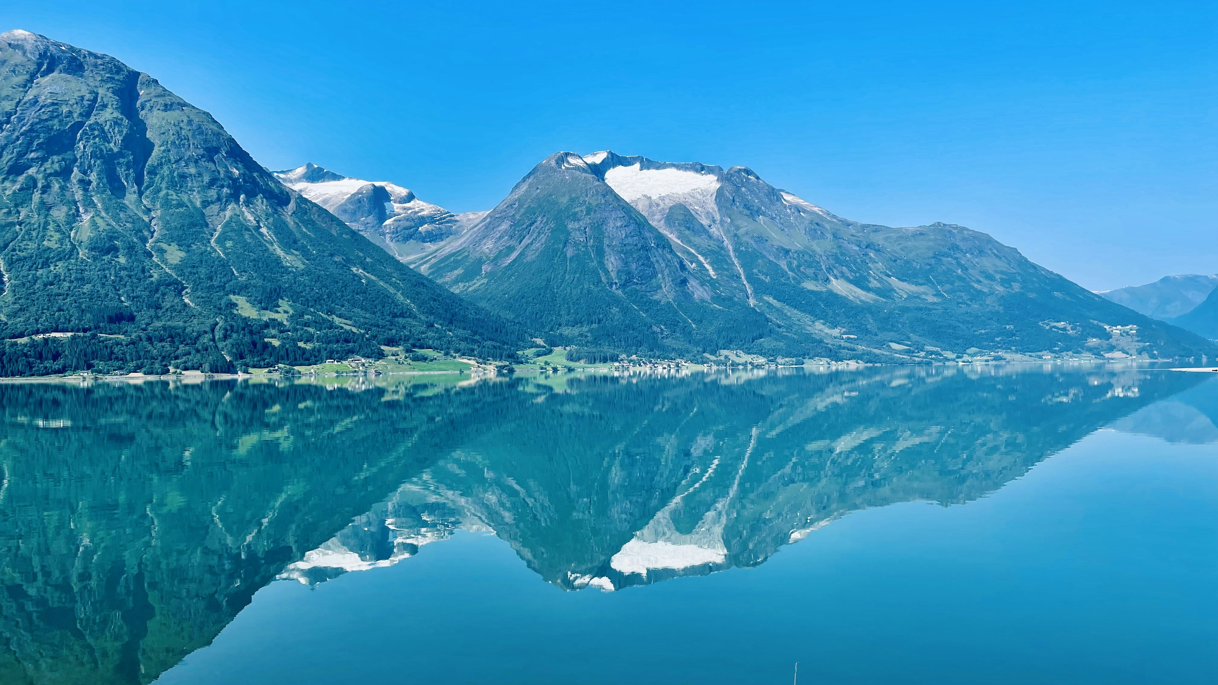 Mirror Lake at the Foot of Alpine Peaks