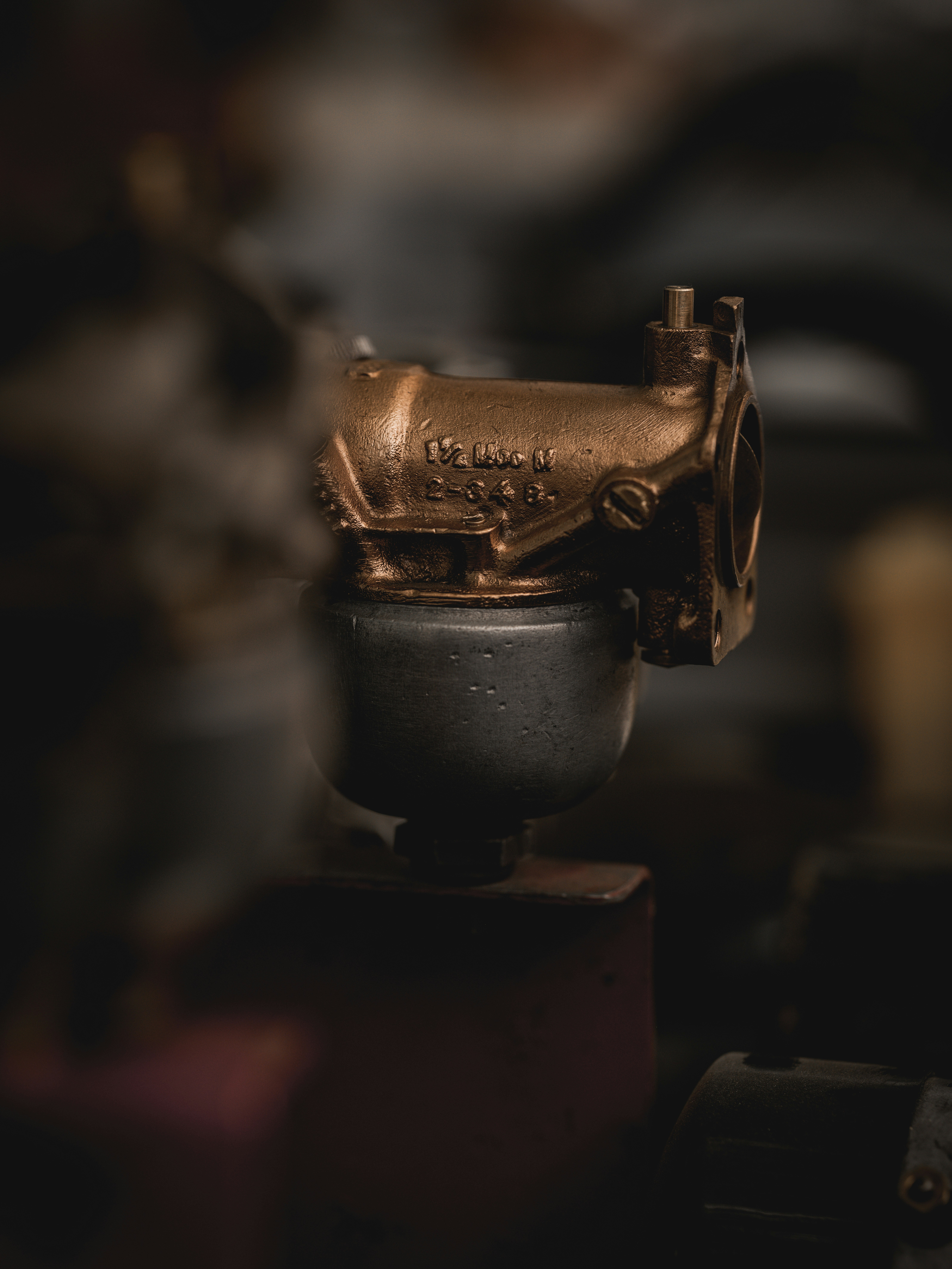 Rusting Engine Heart: A close-up of a vintage component bathed in moody light
