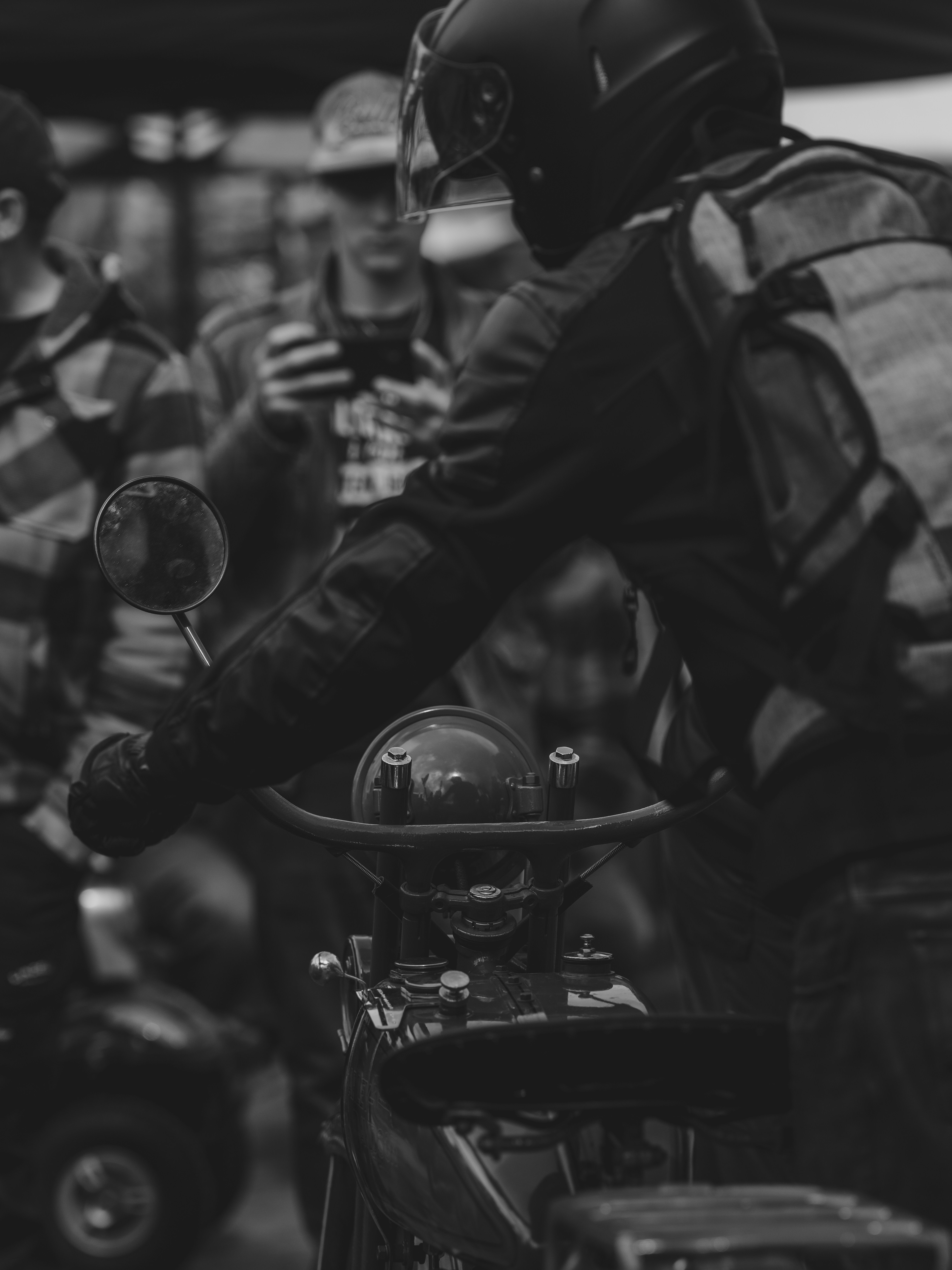 Rider in Focus: A Steady Hand Amid Urban Echoes