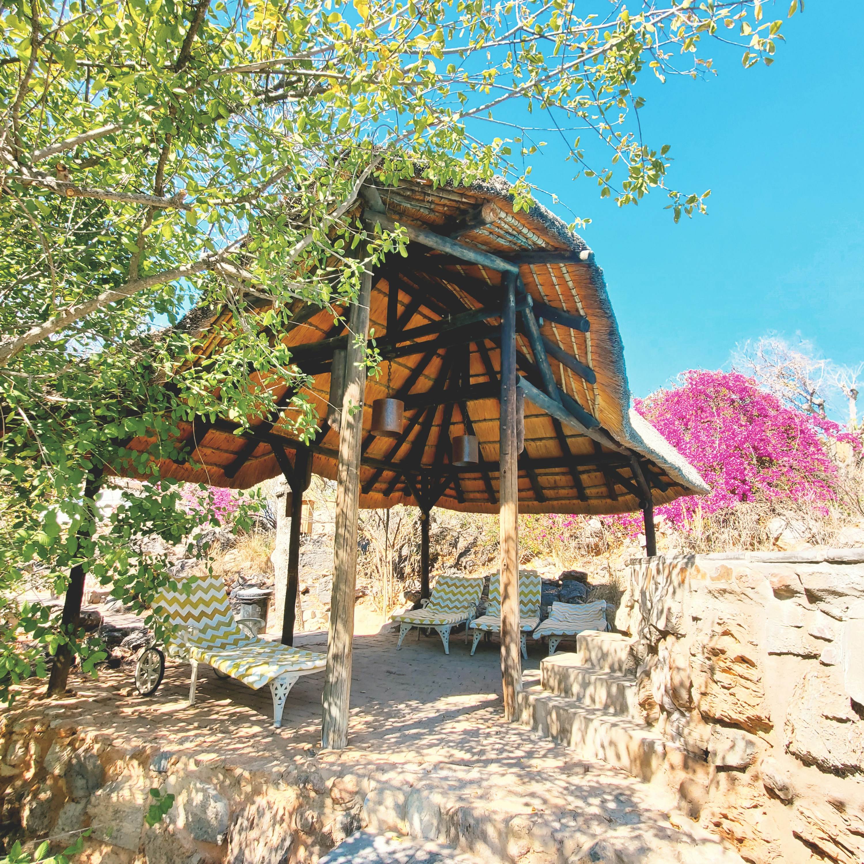 Shaded Hut on a Sunlit Terrace