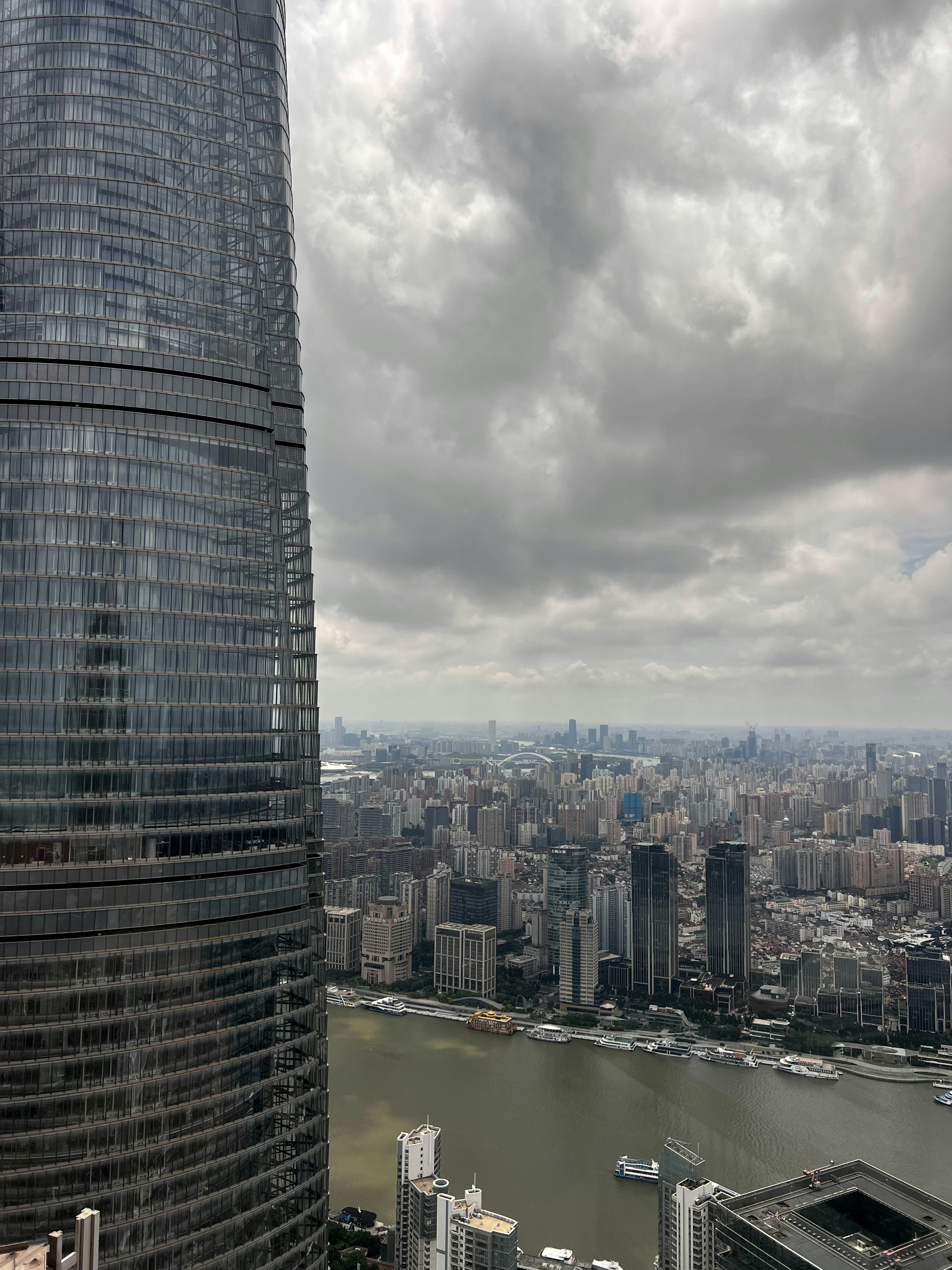 Twin Glass: Skyward Giant Over the River City