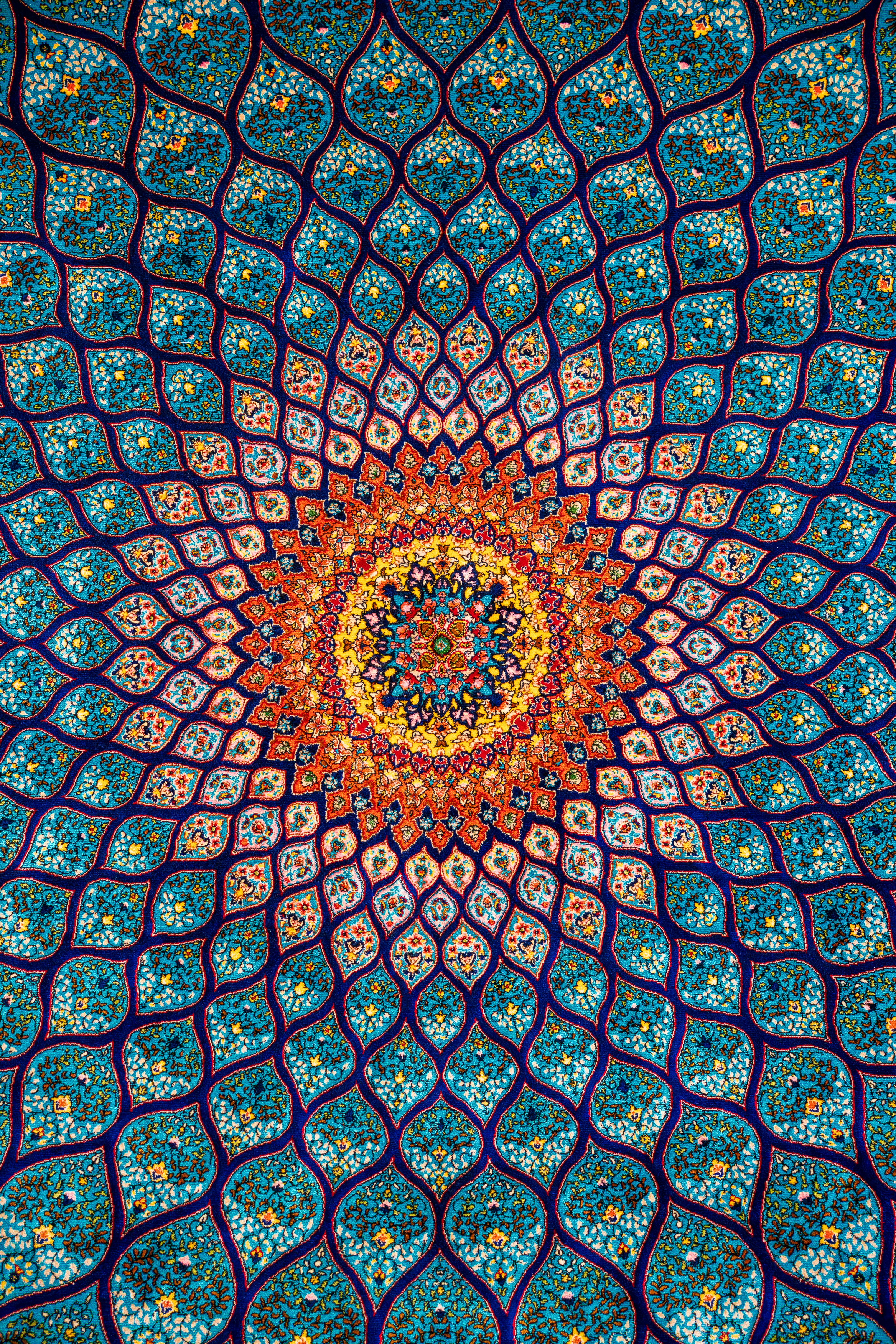 Mandala of Tiles: A Turquoise and Amber Radial Tessellation