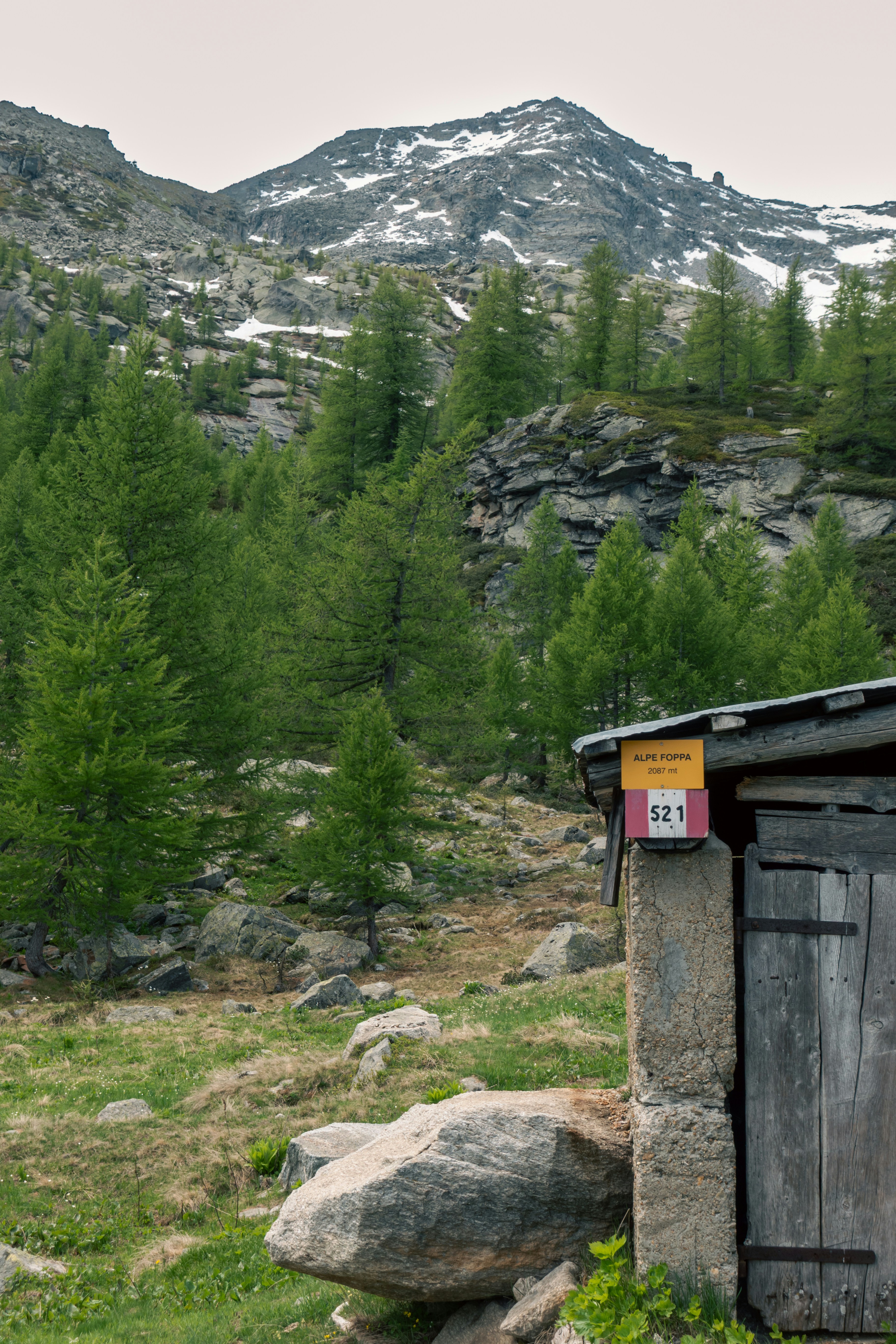 Alpine Cabin and Peak Drenched in Quiet Light