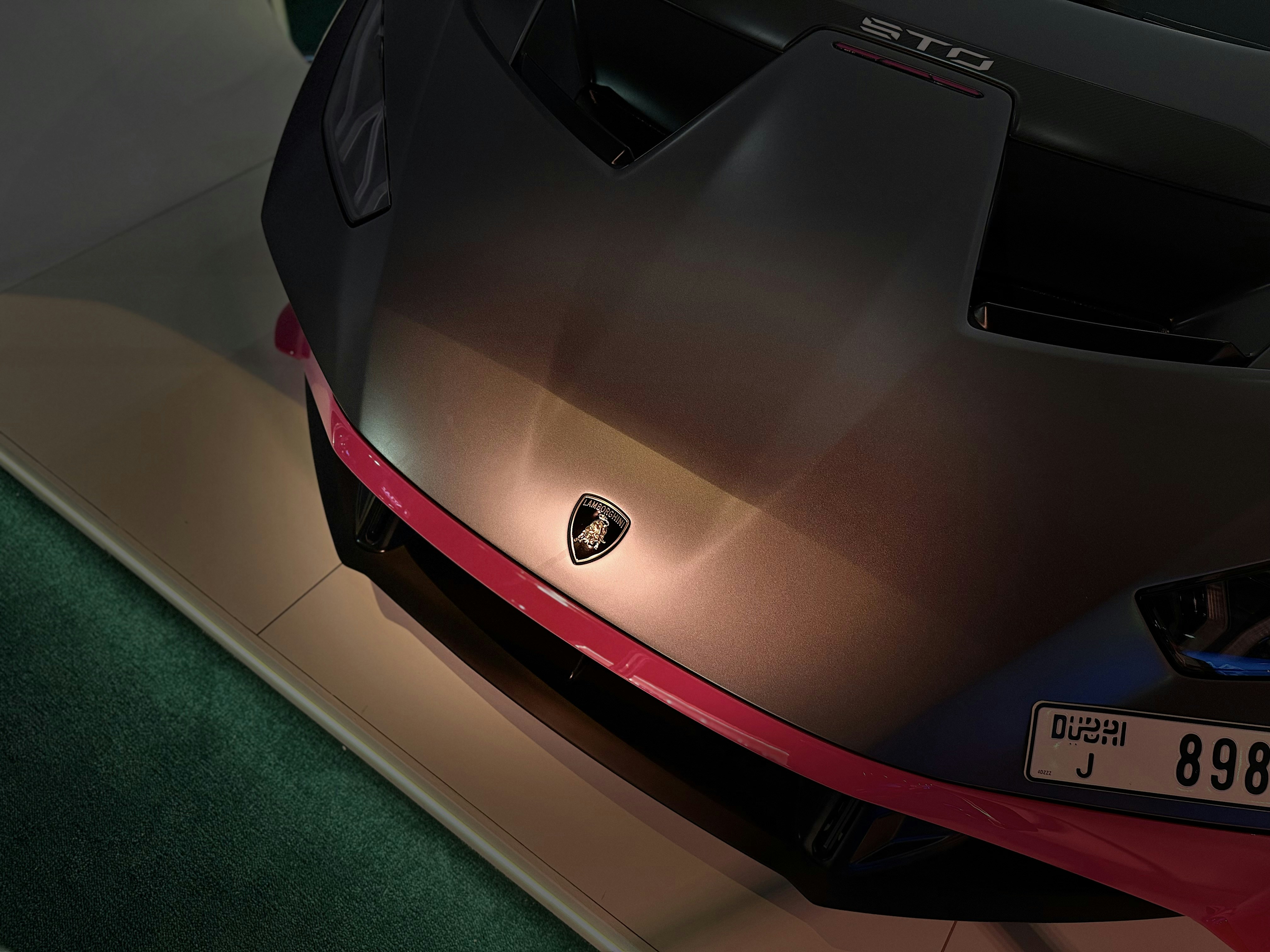 Rosso Shadow: The Front Hood of a Sleek Diablo-Inspired Supercar
