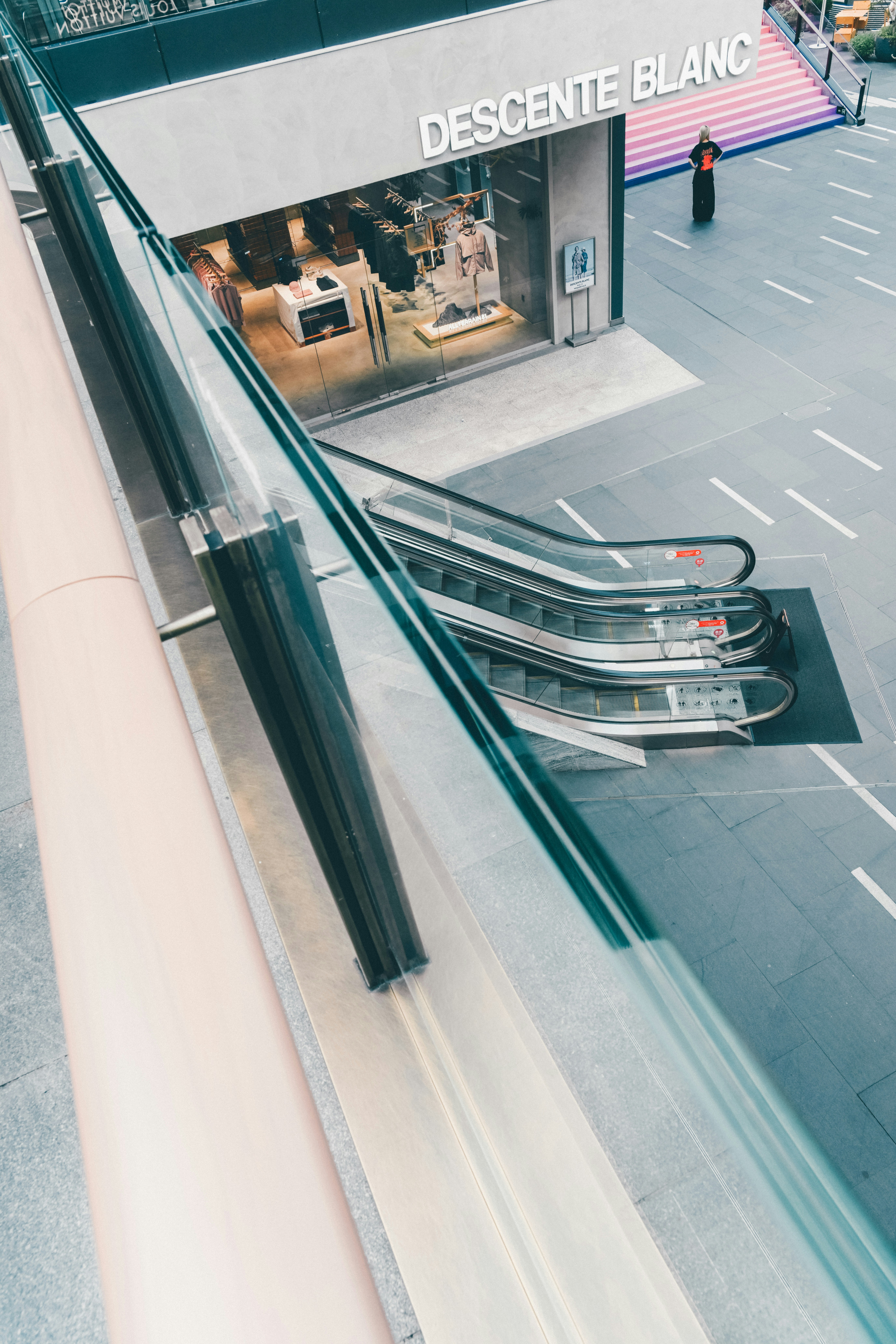 Escalator to a Quiet Deserted Storefront