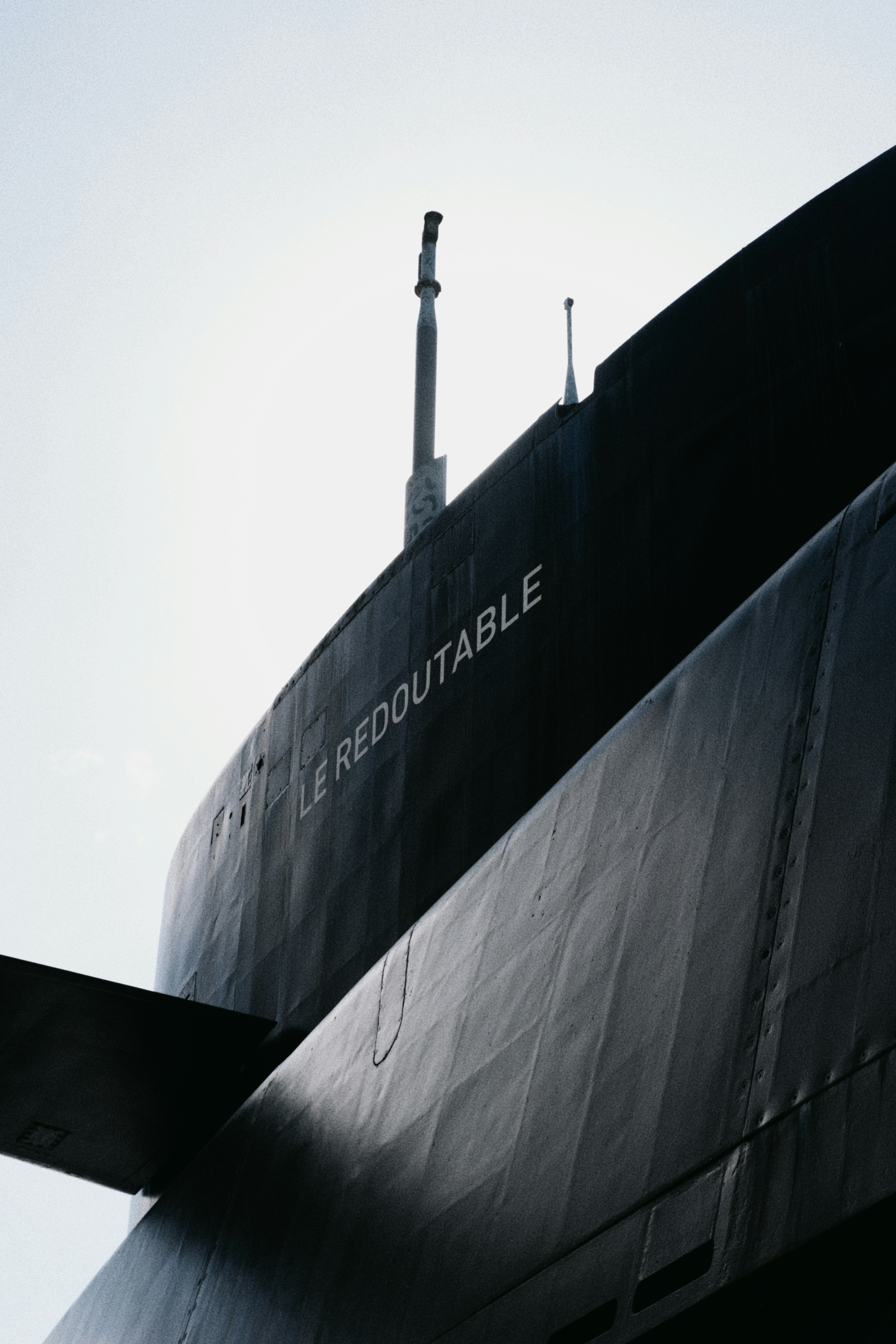Iron Giants: The Silent Vessel Rises from the Shore