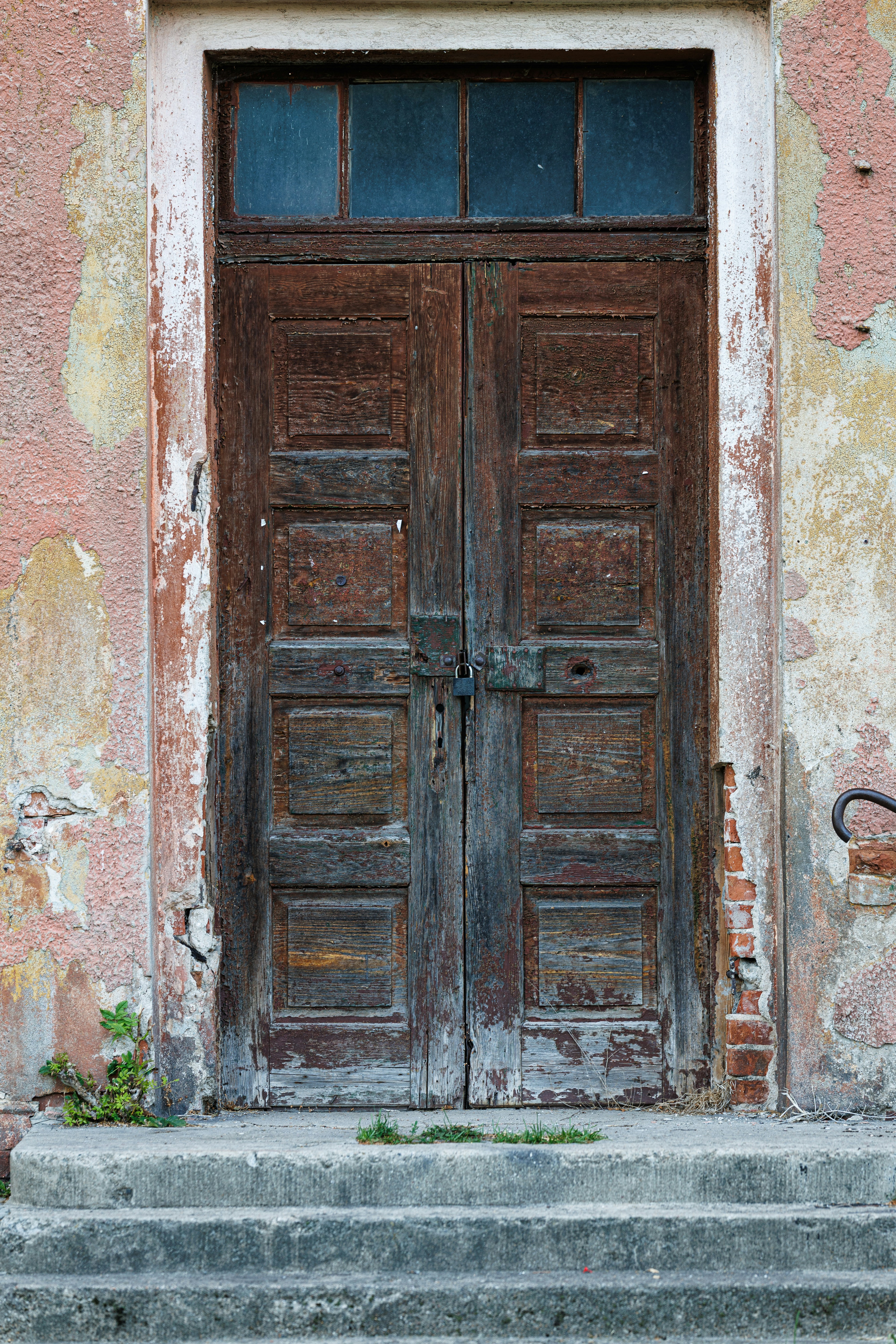 Weathered Doors of a Silent Facade