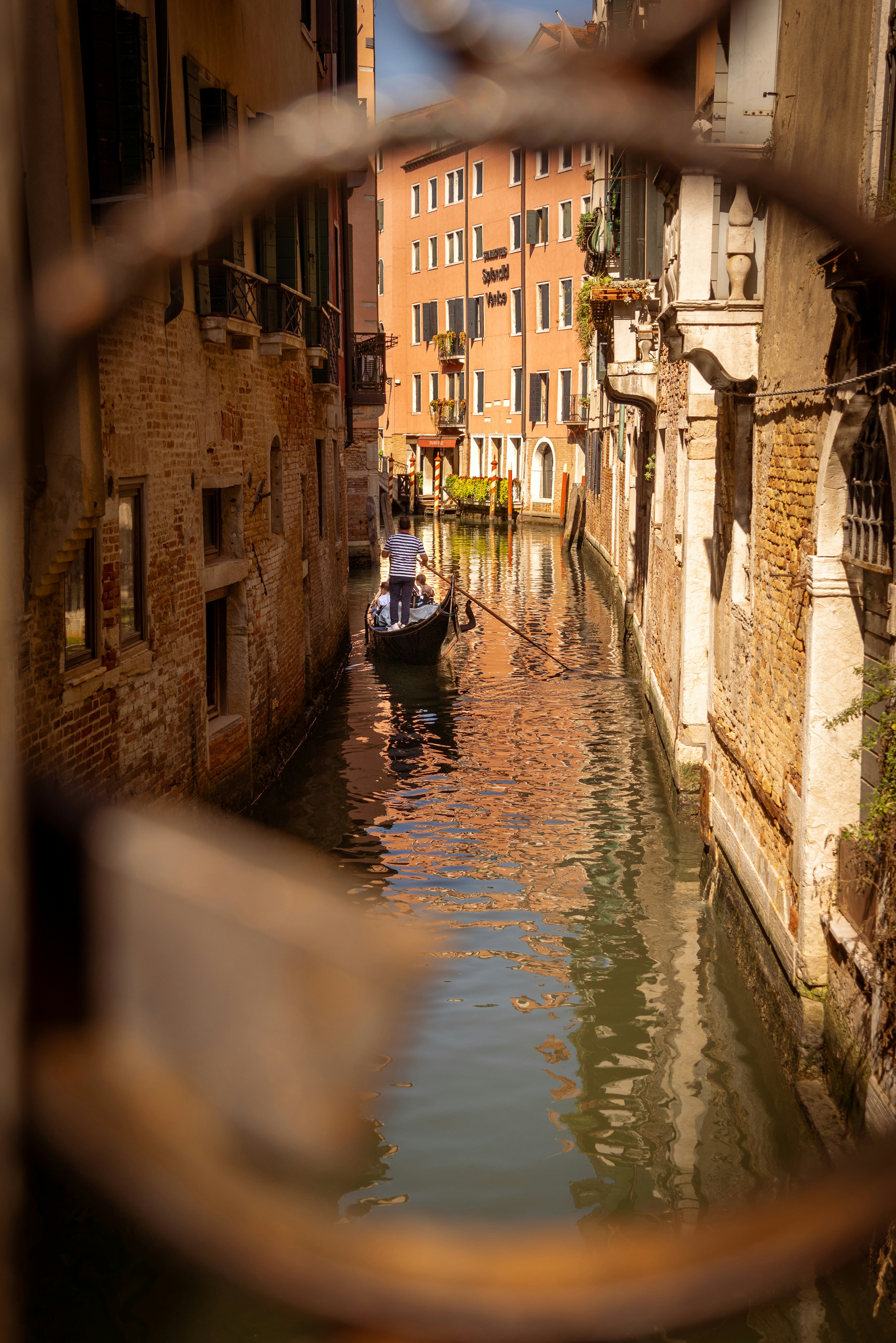 A Venetian Channel Framed by a Circular Window