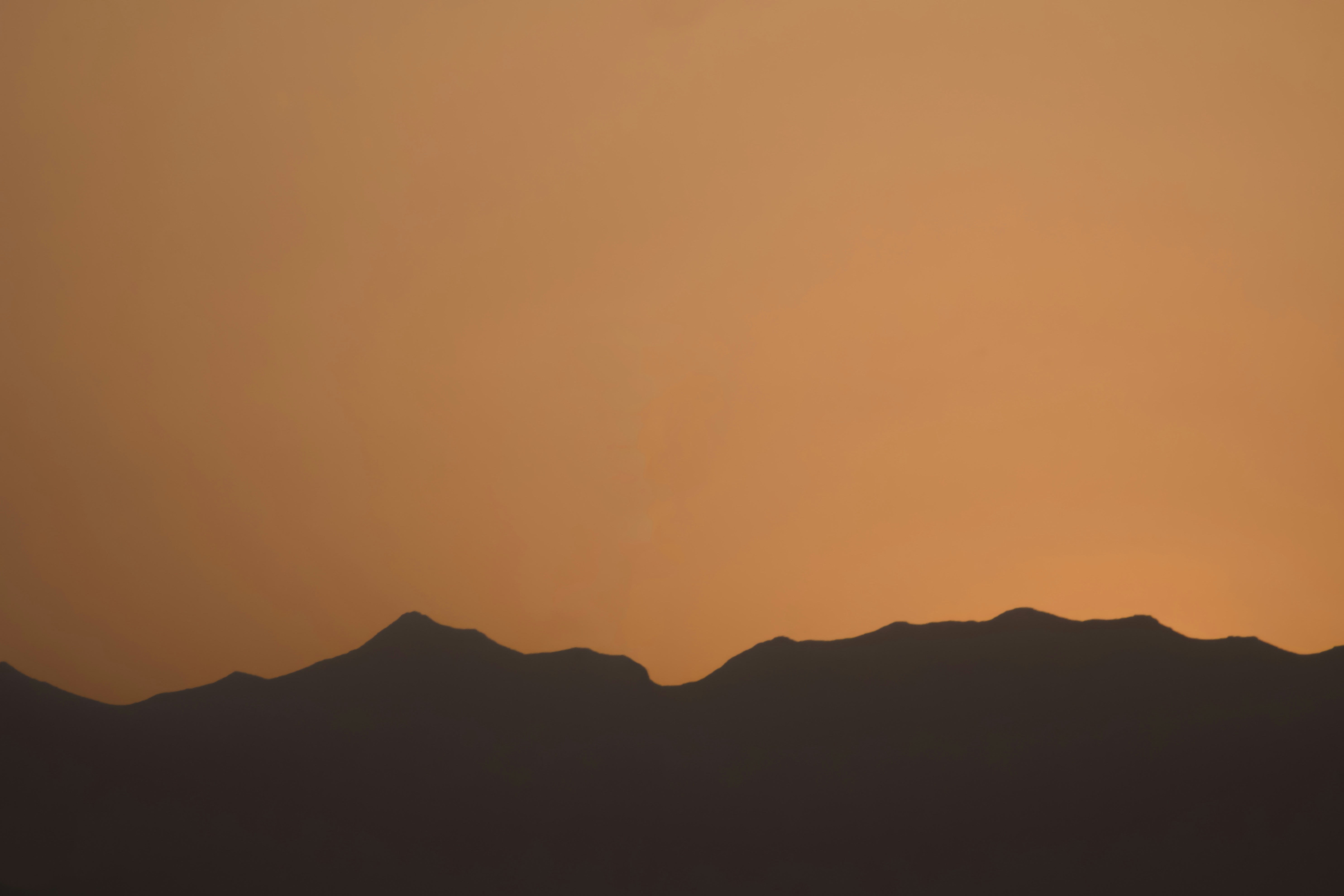 Dusk Silhouette over Quiet Peaks