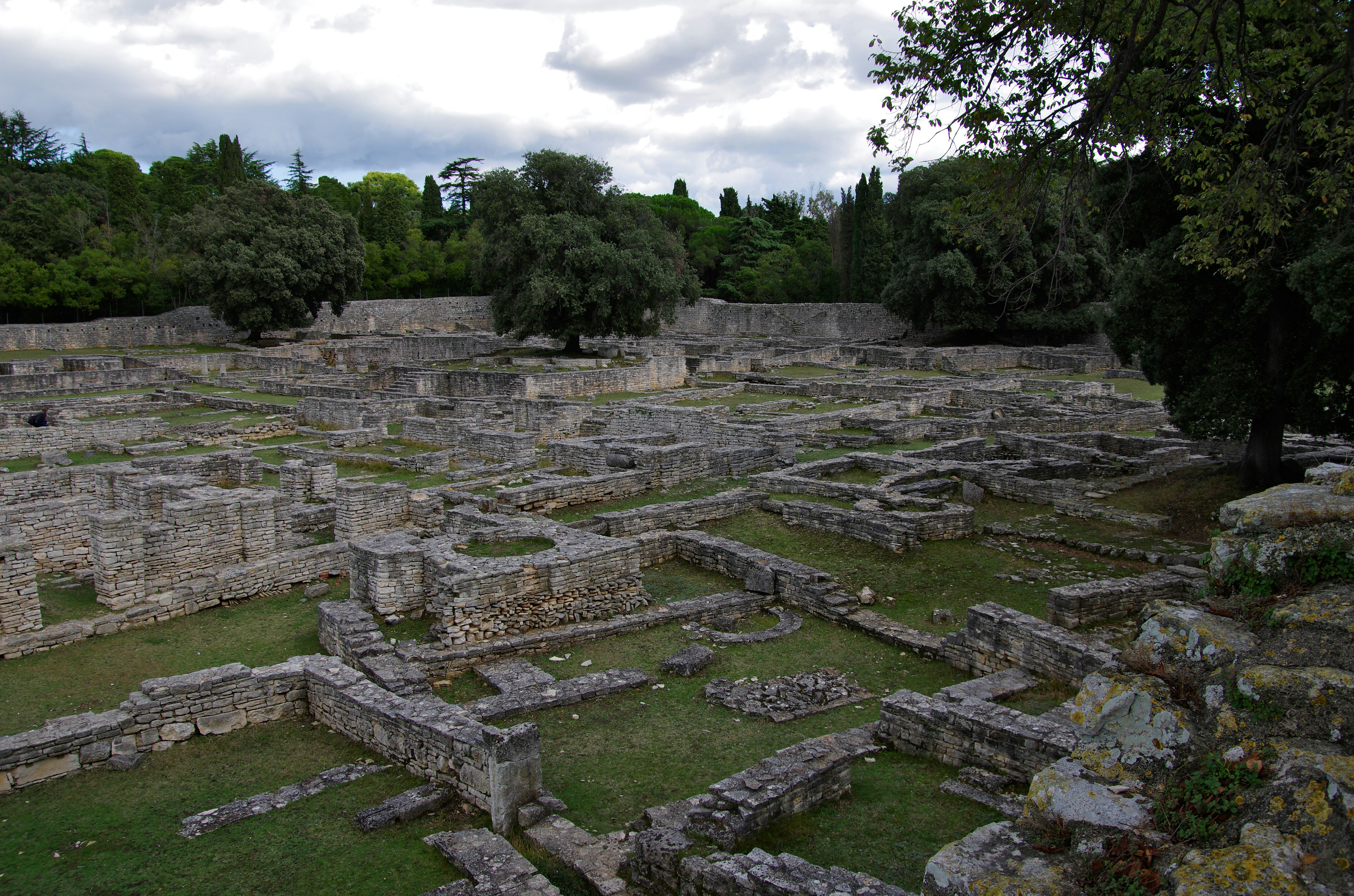 Stone labyrinth: Ancient ruins unfurling into a quiet park