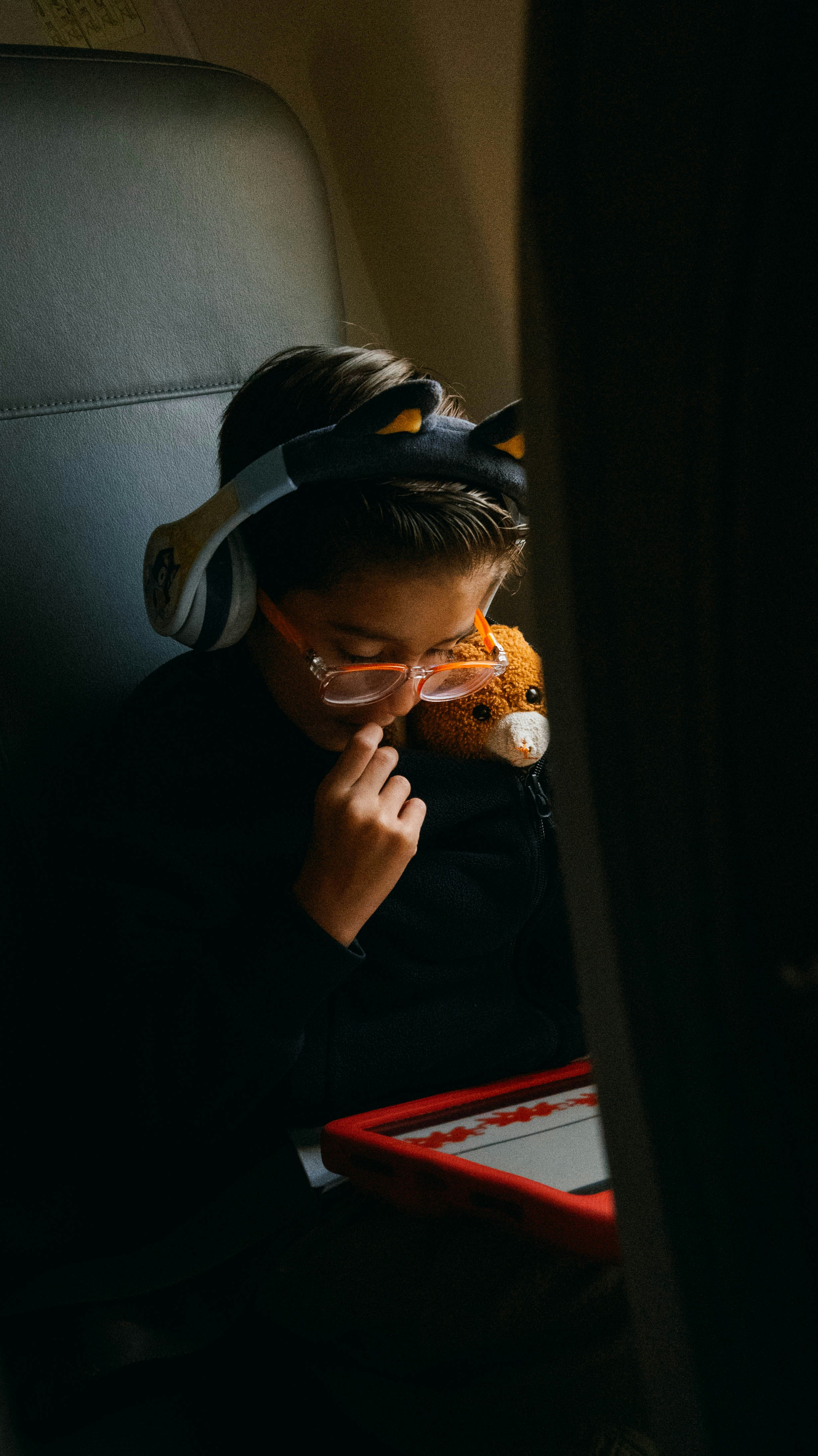 Soft Focus, Sharp Heart: A Quiet Moment with a Child and a Plush Companion