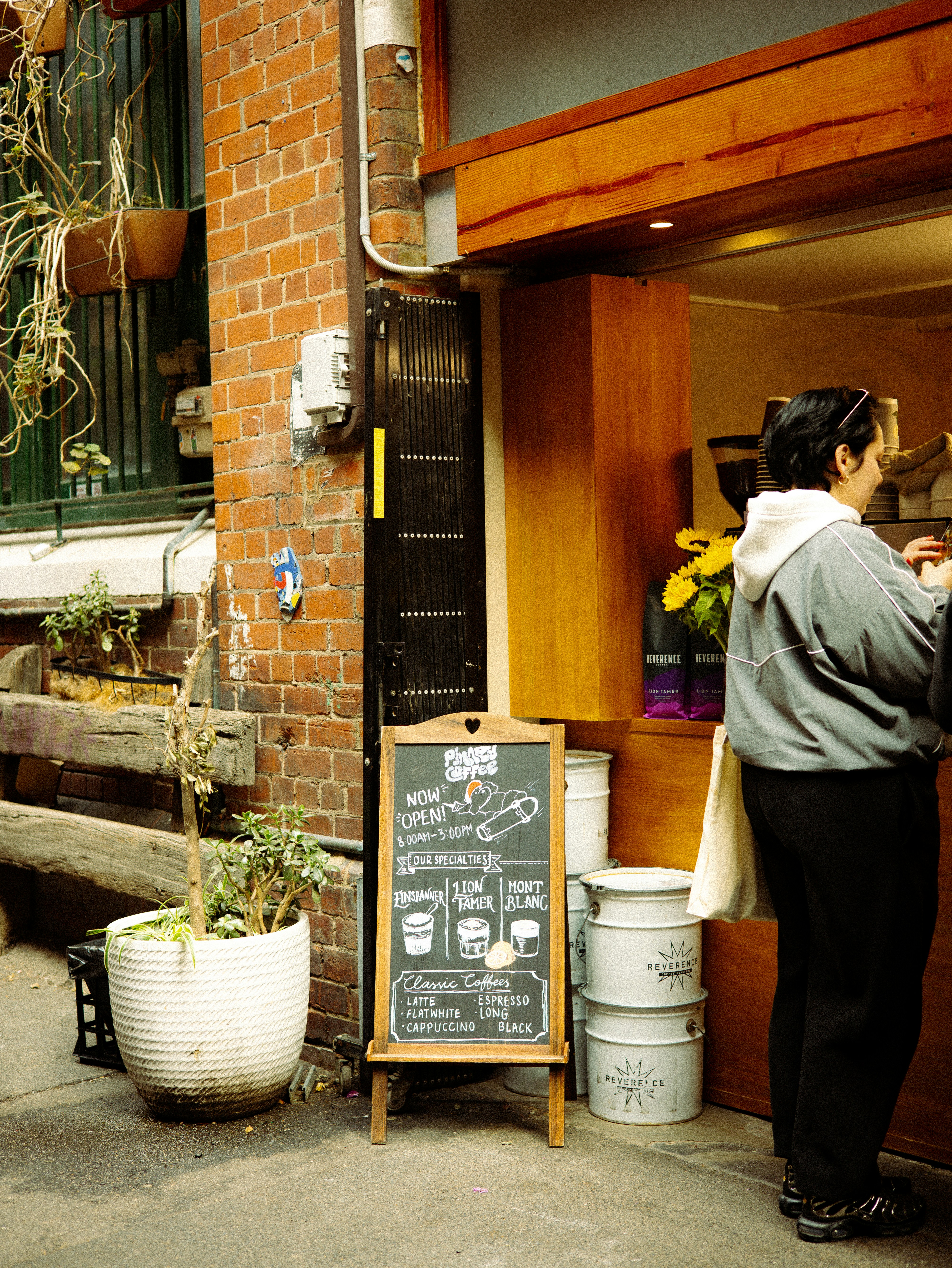 Cafe Corner: Quiet Figure at the Doorway