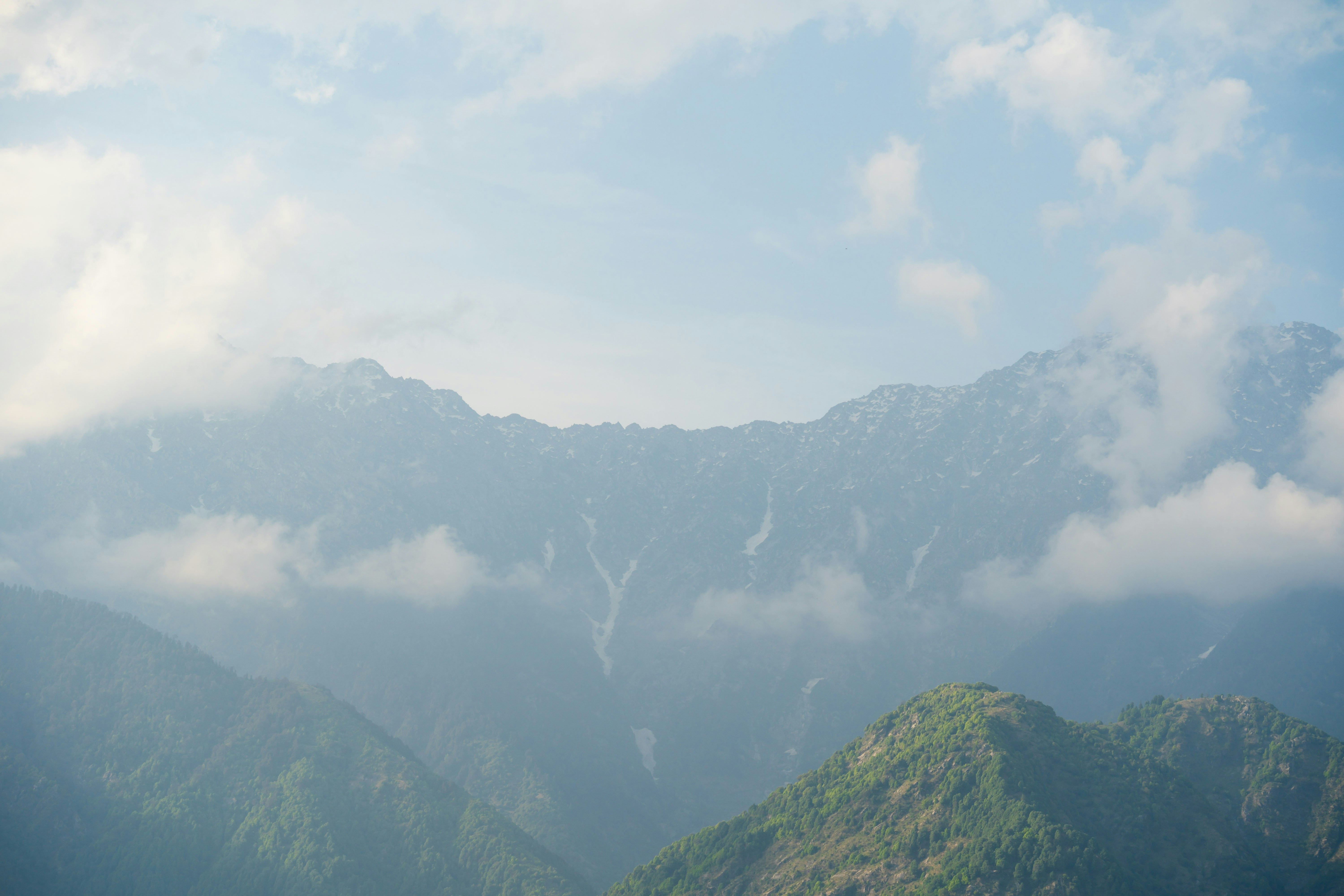 Misty Ridge: Soft Light Over Quiet Valleys