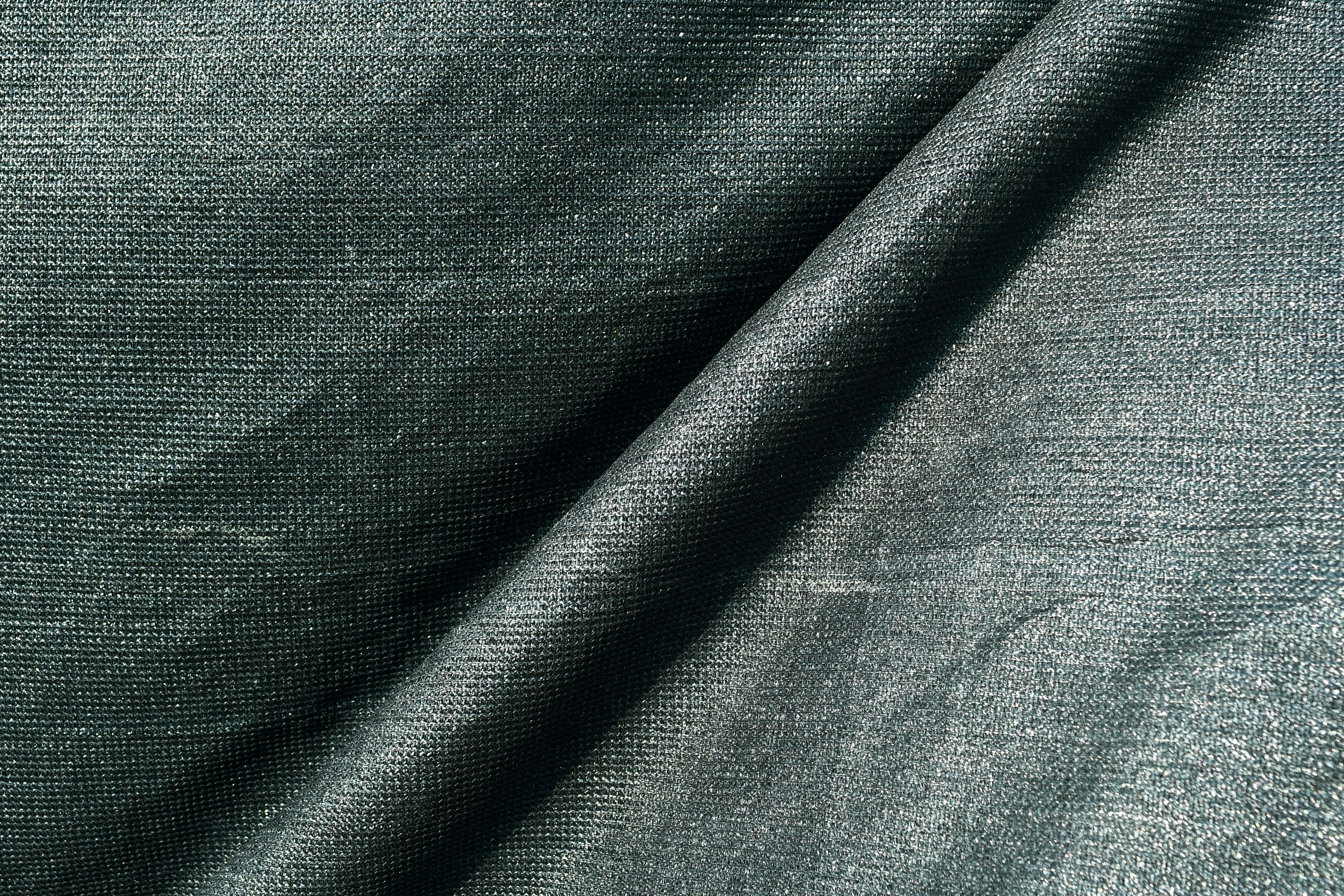 Folded Shade: A Close-Up of Textured Fabric Rhythm