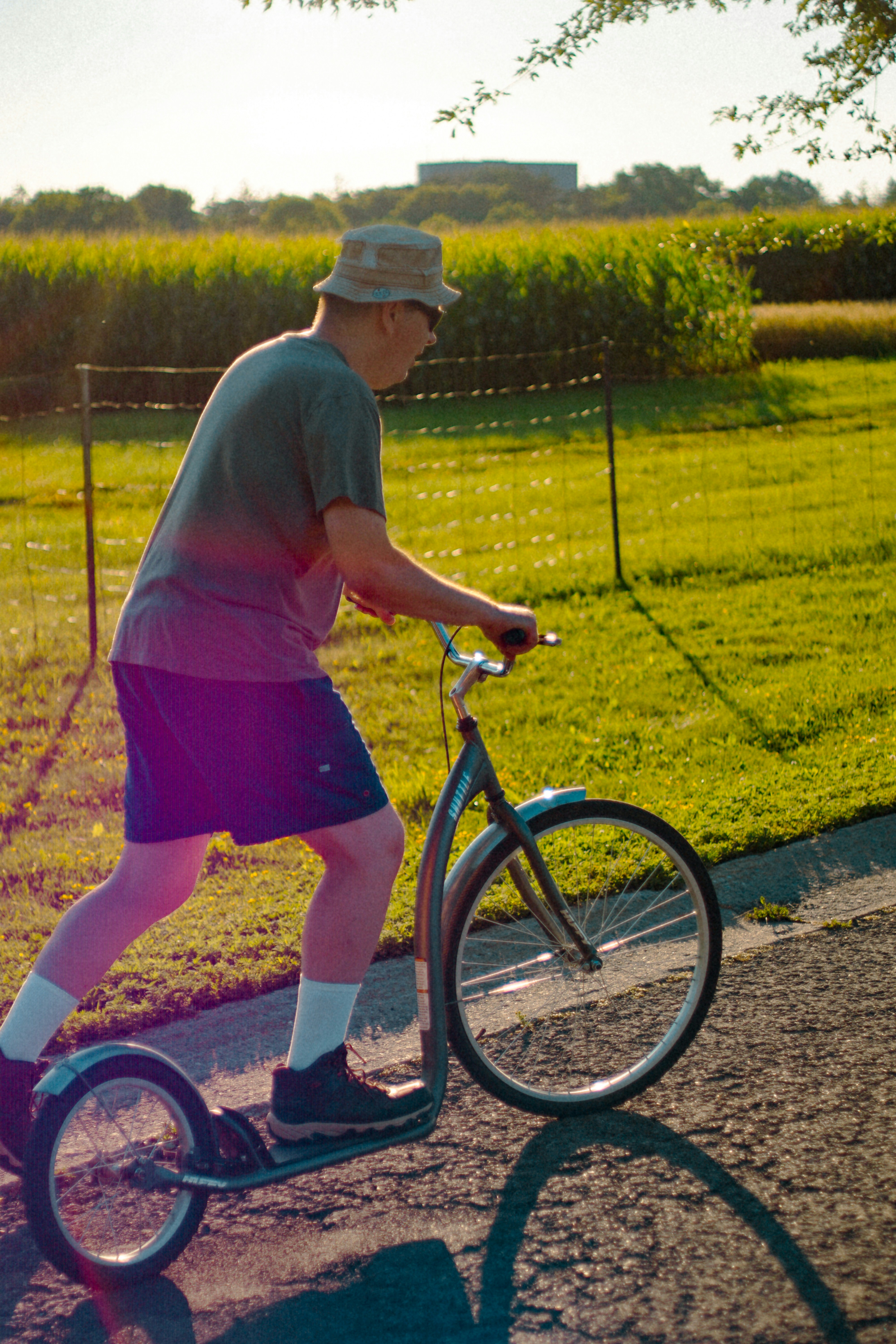 Candid Ride at Dusk: A Pedaler in Focus