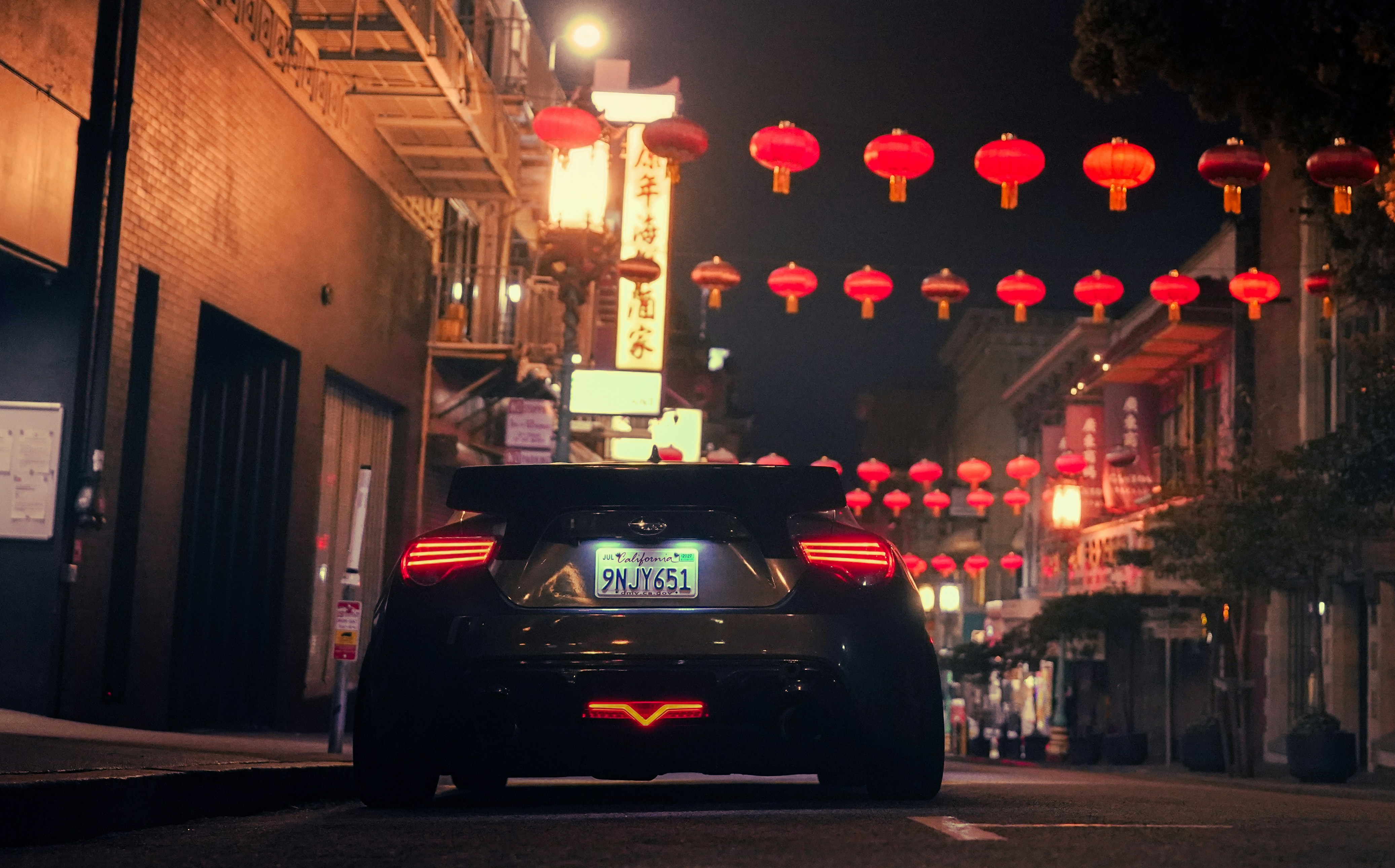 Neon Lanterns and tail lights: a midnight Chinatown drive