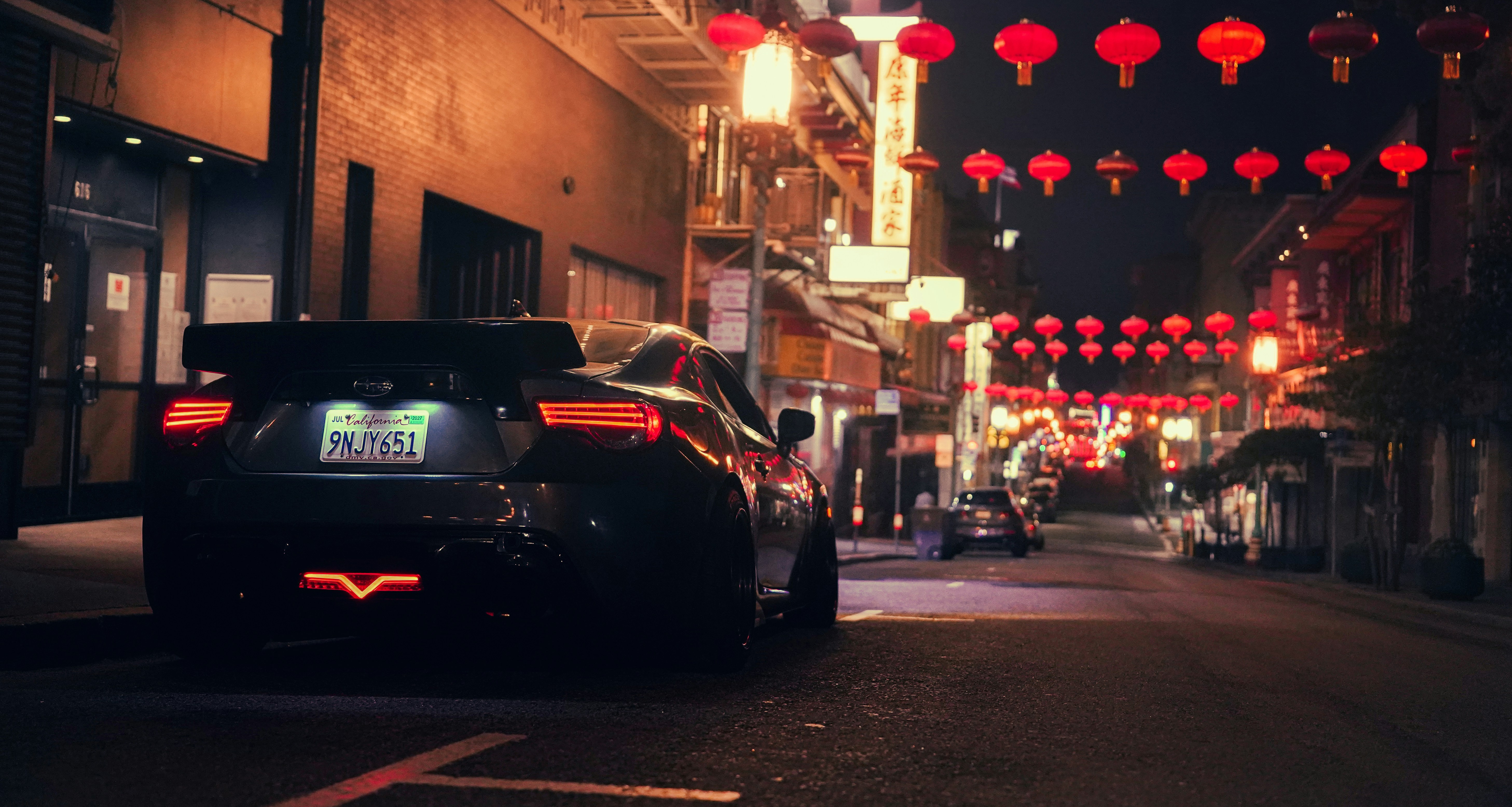 Neon Night: A Quiet Street Immersed in Lantern Glow