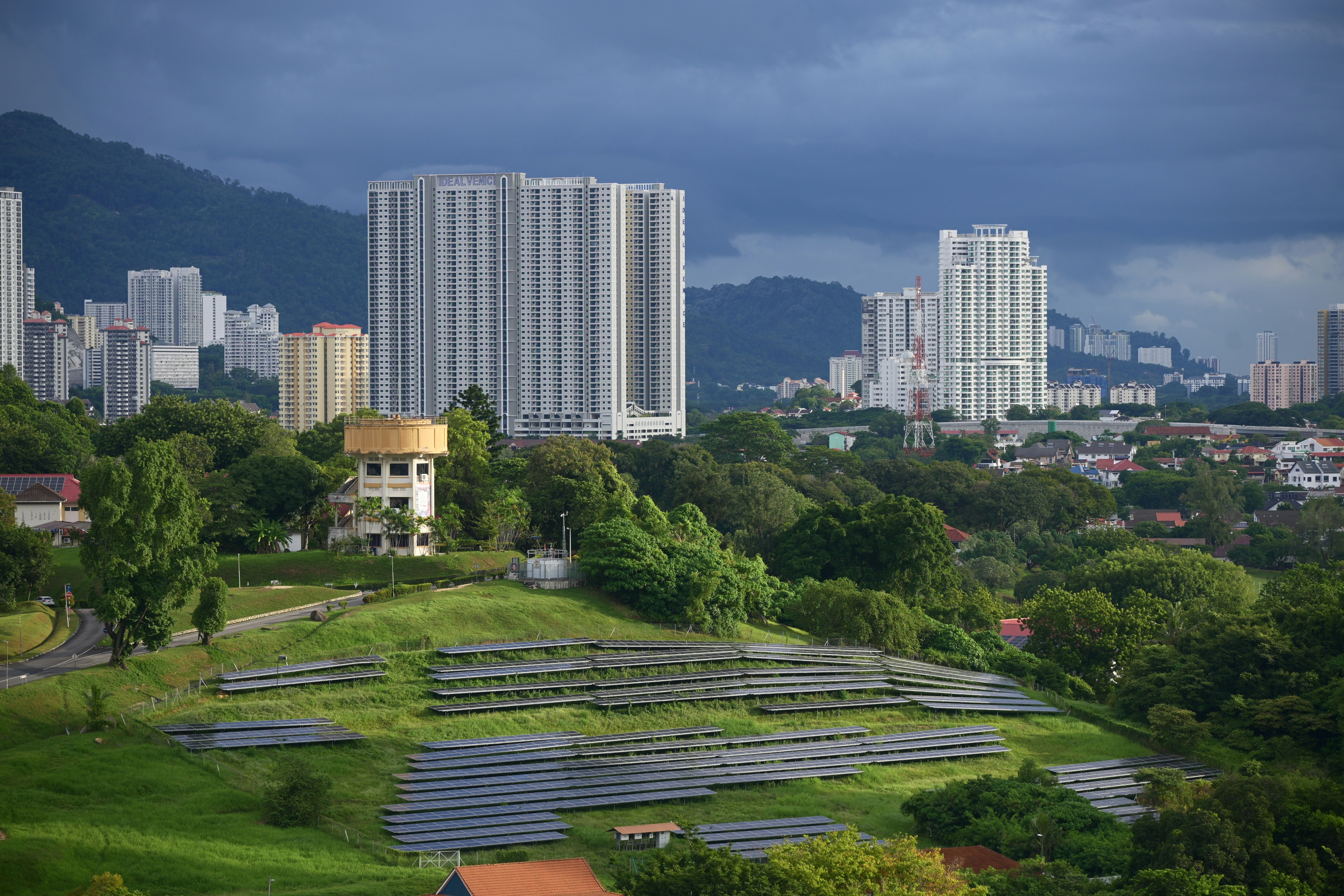 Cityscape over Solar Terraces: A Green Roof meets High-Rrise Horizon