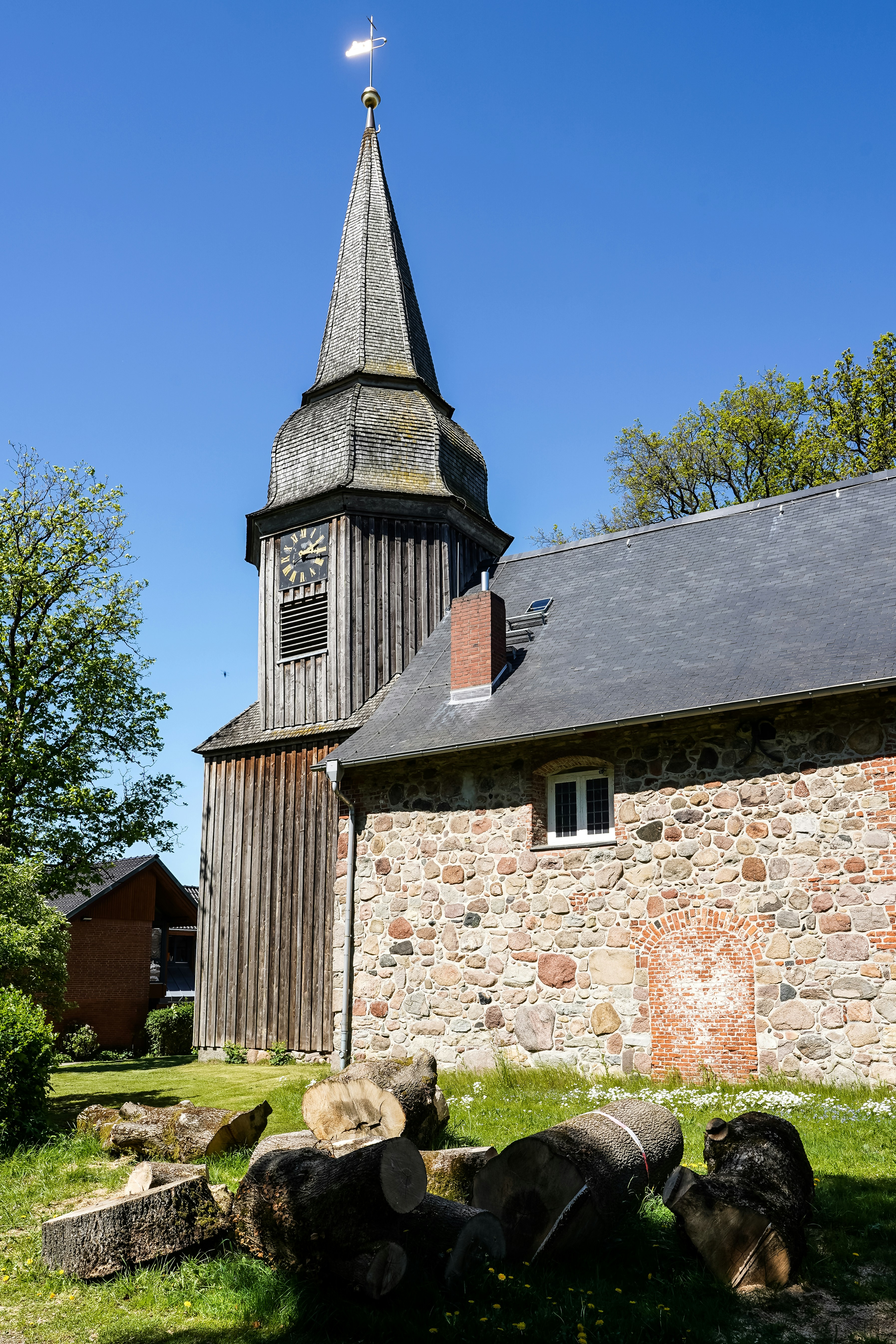 Timber-Tower Church Under a Clear Nordic Blue